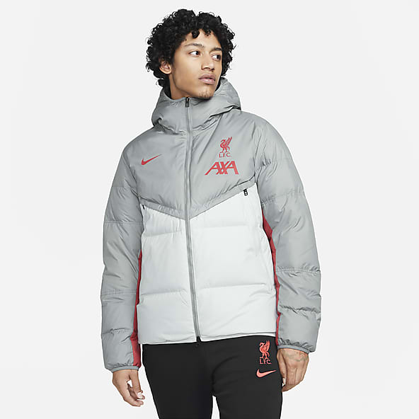 Staying Warm Storm-FIT Puffer Jackets. Nike IE