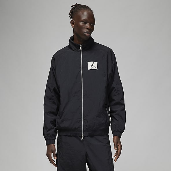 Staying Warm Recycled Polyester Tracksuits. Nike LU
