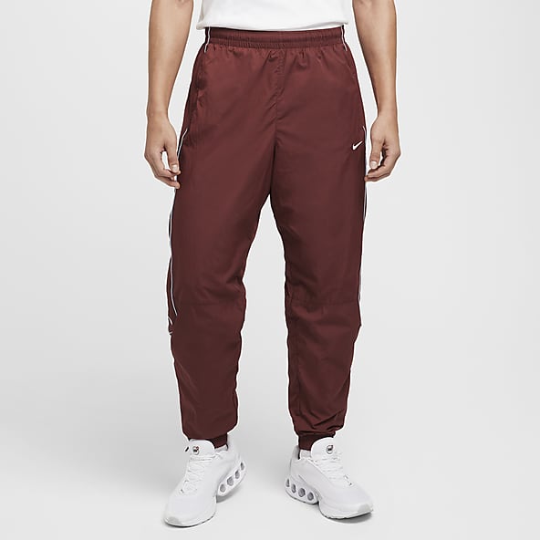 Brown Solo Swoosh Tracksuits. Nike.com