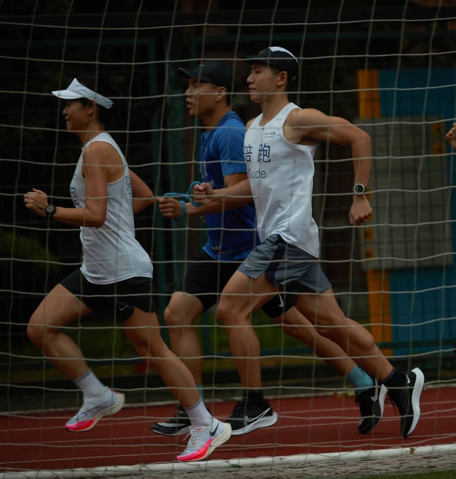 Behind some visually impaired runners are running pacers. Nike.com