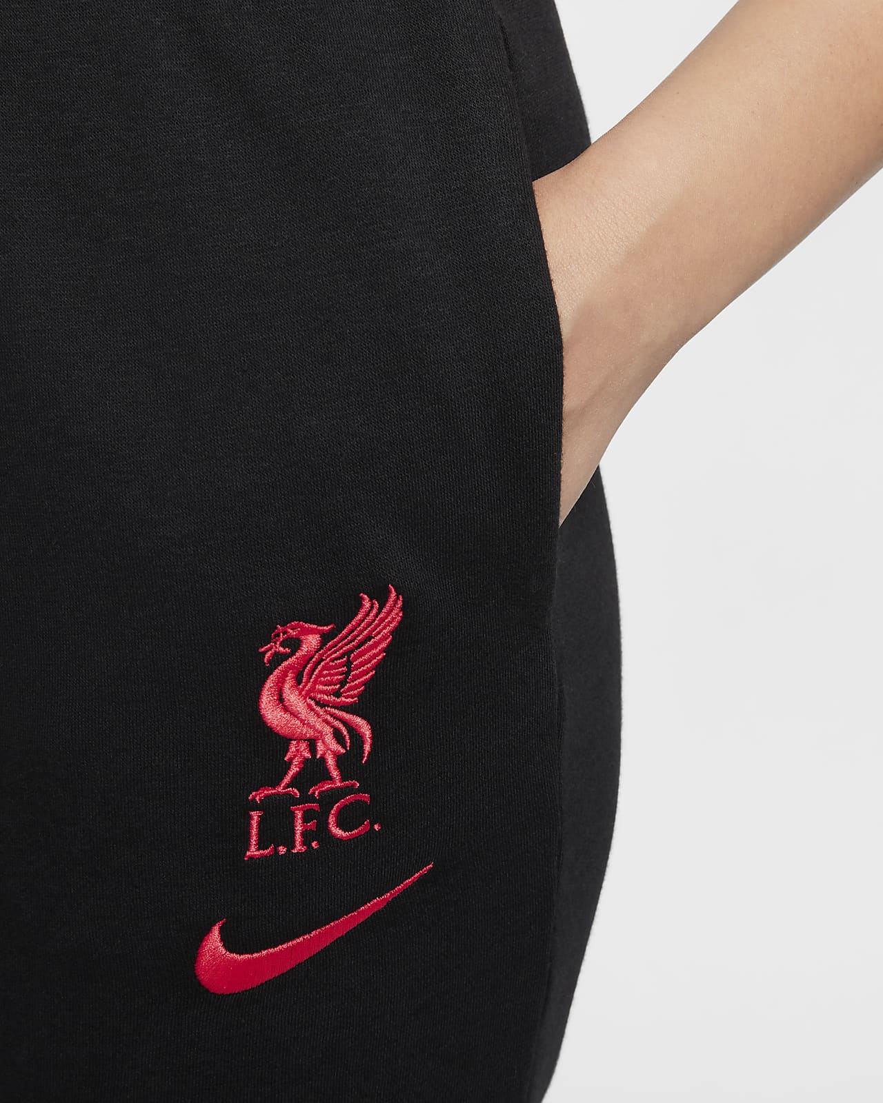 Liverpool F.C. Club Fleece Women's Mid-Rise Pants. Nike DK