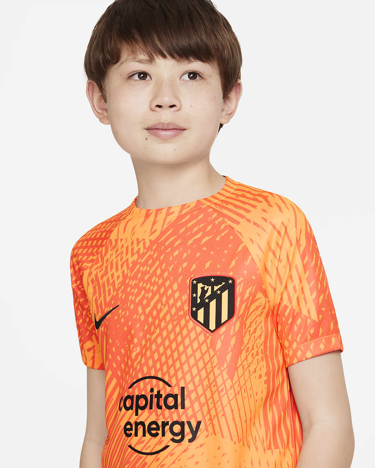 Atlético Madrid Older Kids' Nike Dri-FIT Pre-Match Football Top. Nike IE