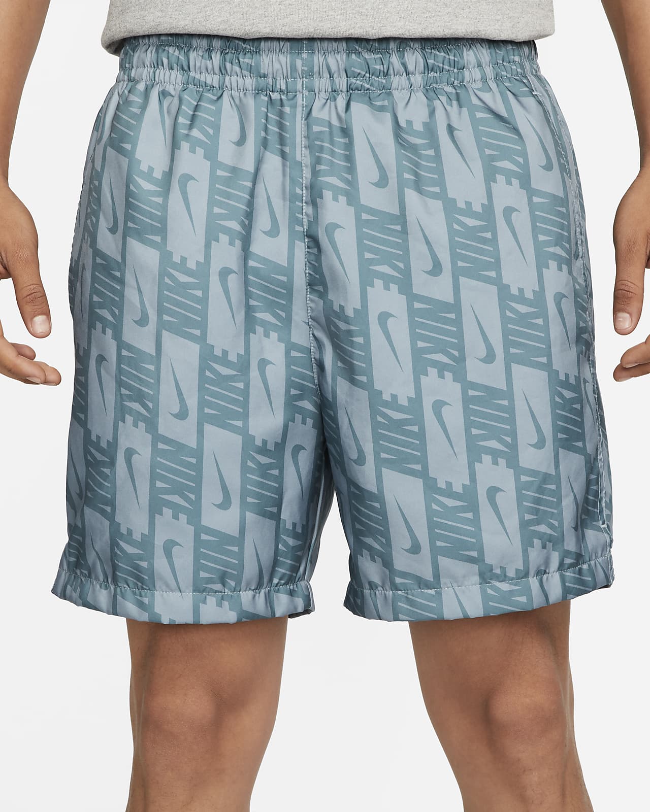 Nike Sportswear Men's Repeat Woven Flow Shorts. Nike GB