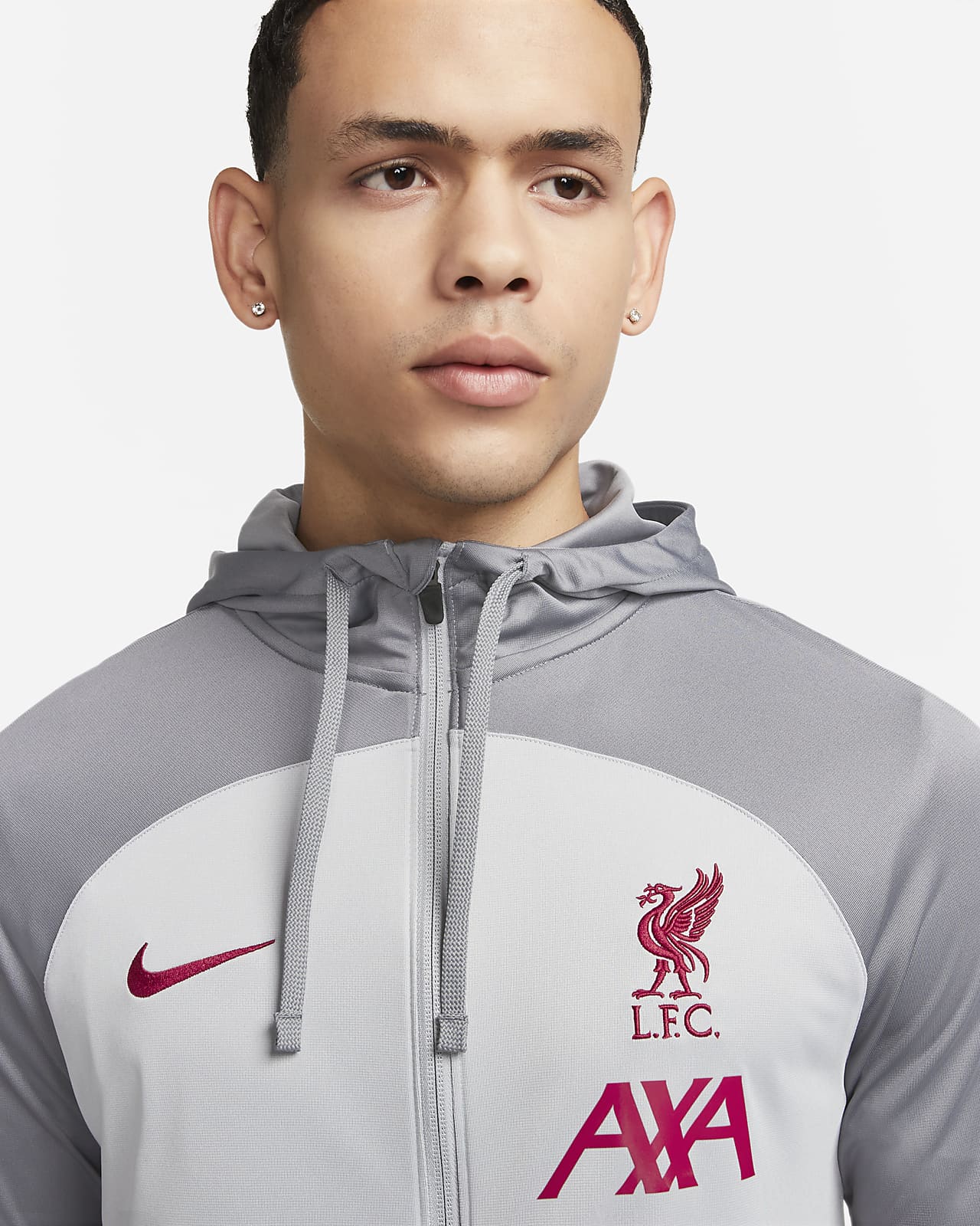 Liverpool F.C. Strike Men's Nike Dri-FIT Hooded Tracksuit. Nike SI