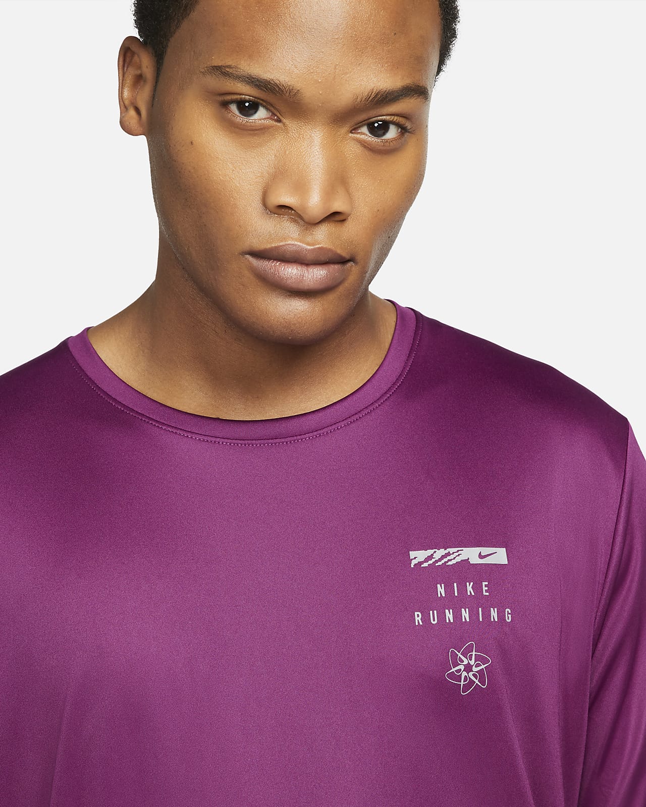 Nike Dri-FIT UV Run Division Miler Men's Graphic Short-Sleeve Top. Nike CZ