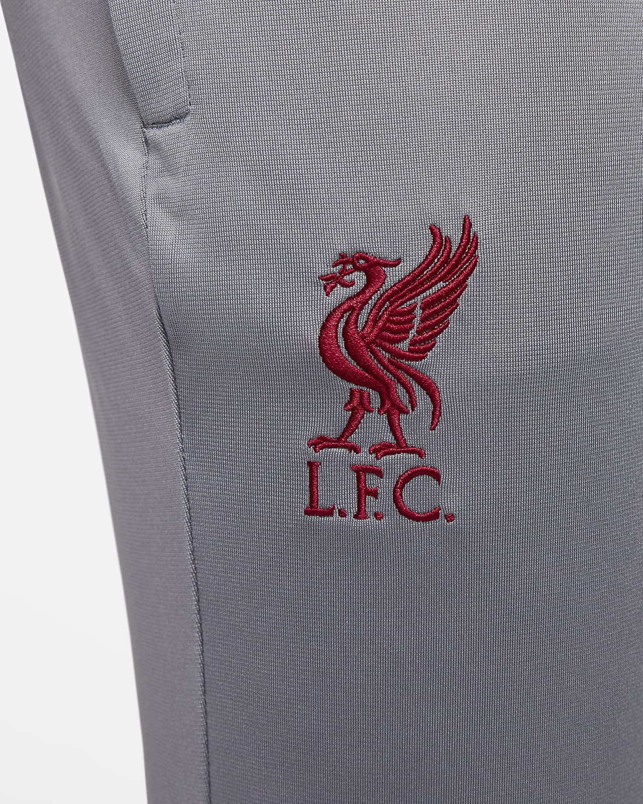 Liverpool F.C. Strike Men's Nike Dri-FIT Hooded Tracksuit. Nike SA