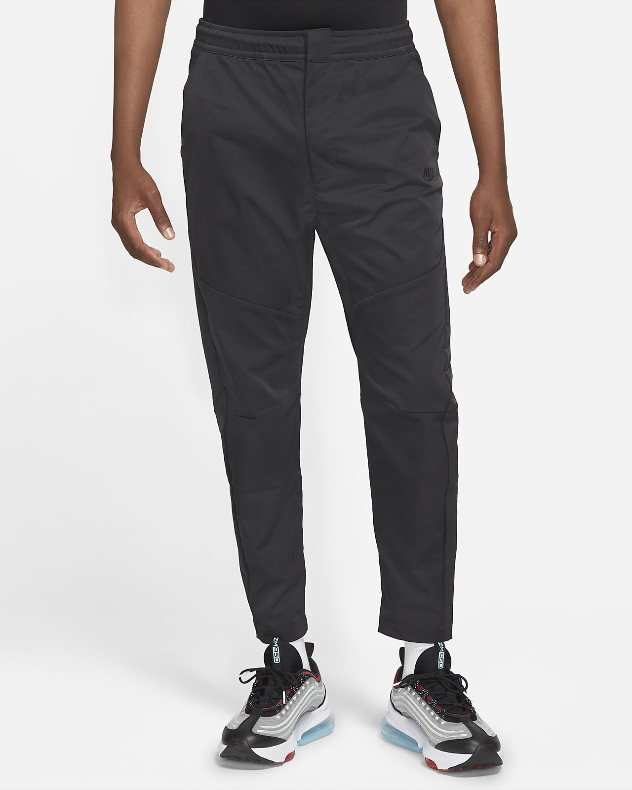 Nike Sportswear Tech Essentials Men's Unlined Commuter Trousers. Nike AT