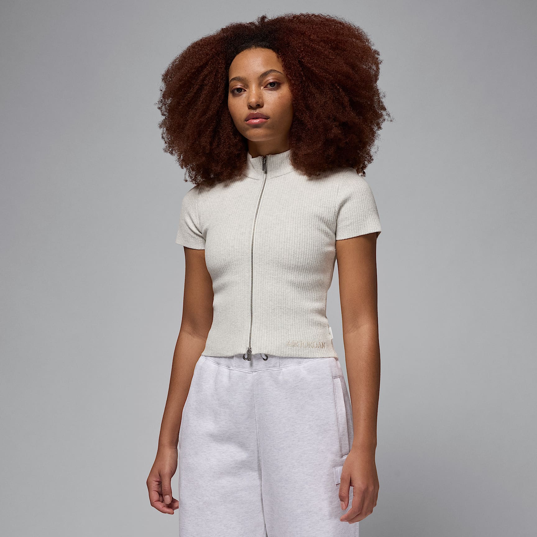Air Jordan Women's Full-Zip Knit Top. Nike HU