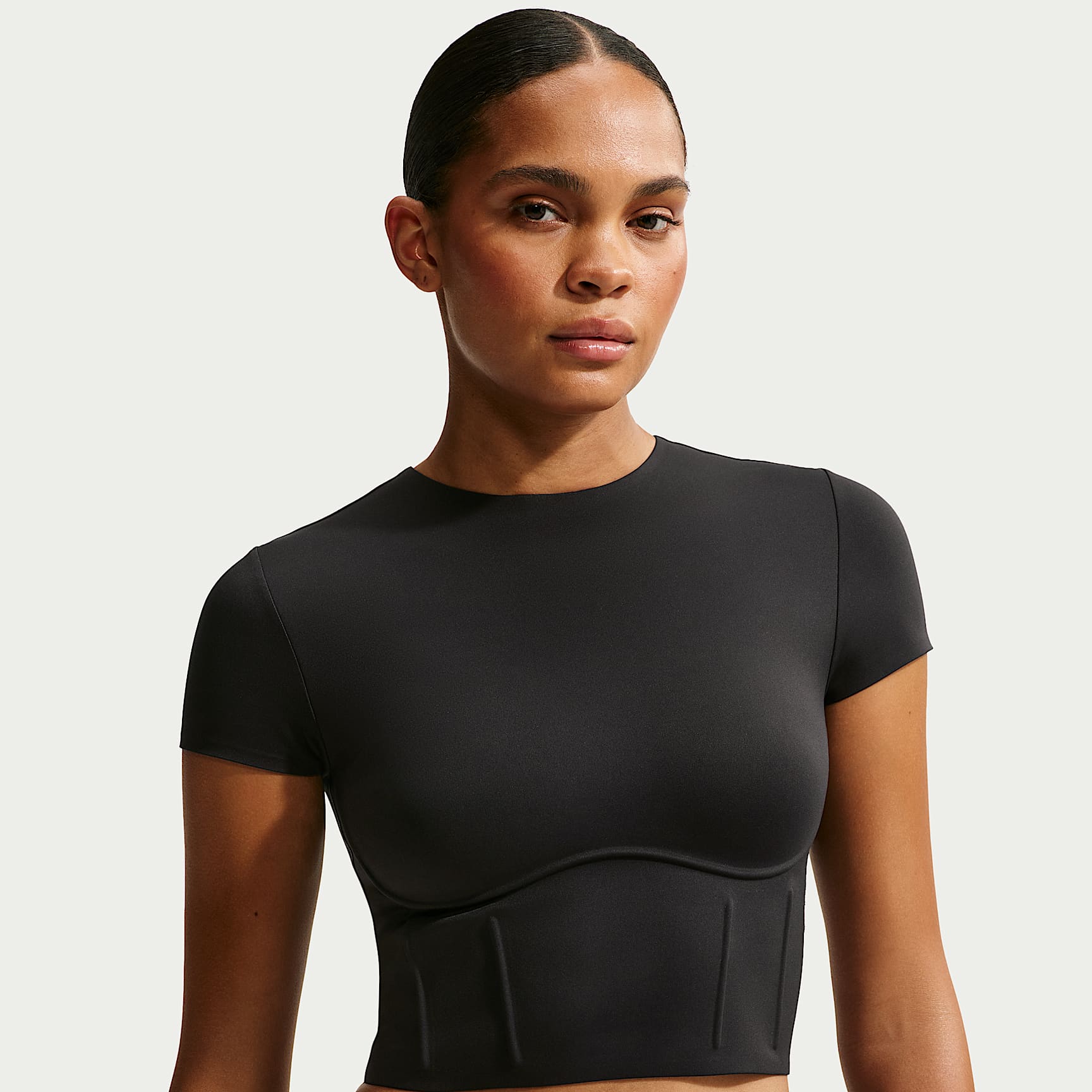 NikeSKIMS Matte Crop top tipus cotilla - Dona. Nike ES