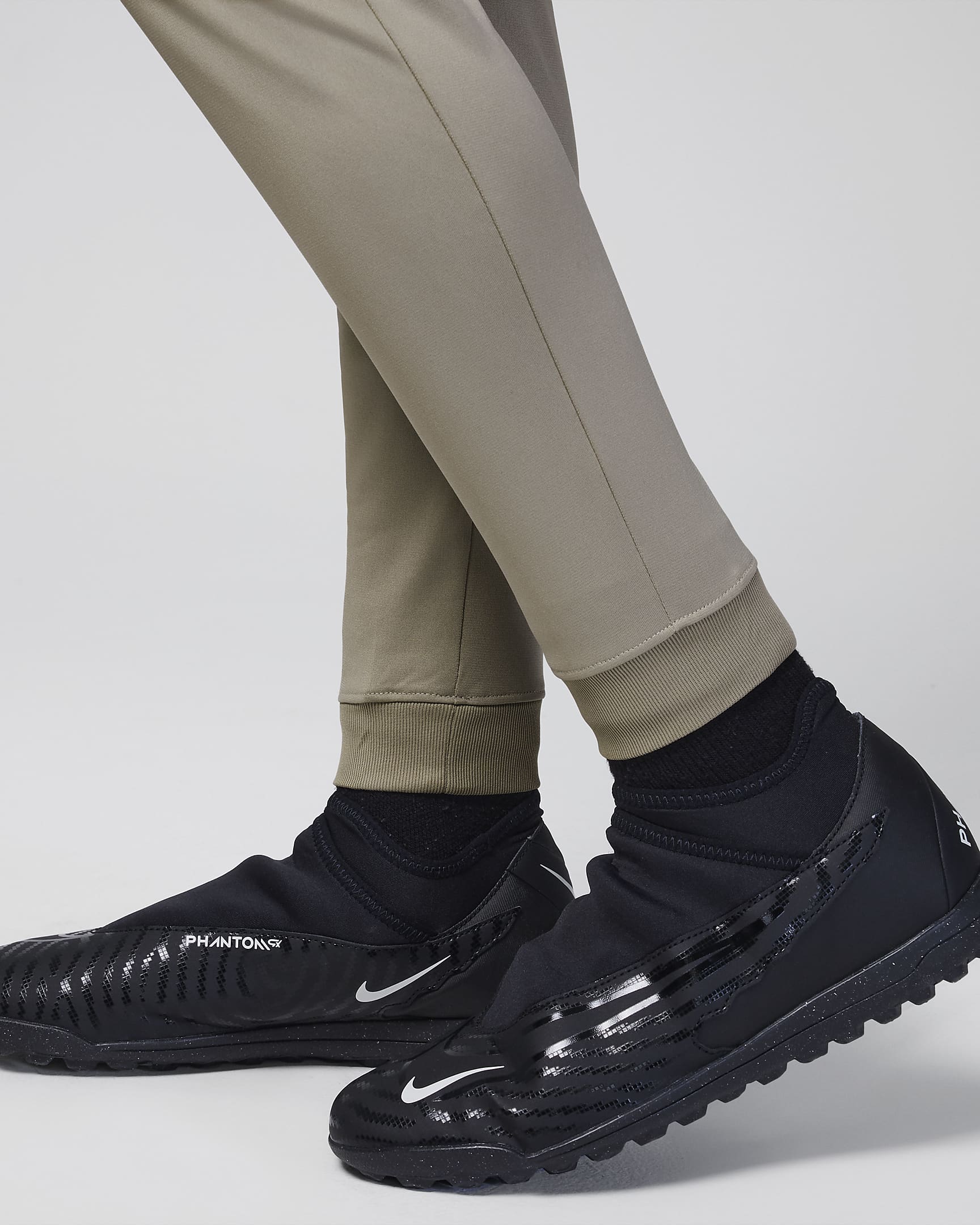 Paris Saint-Germain Strike Third Older Kids' Jordan Dri-FIT Football Hooded Knit Tracksuit. Nike CA