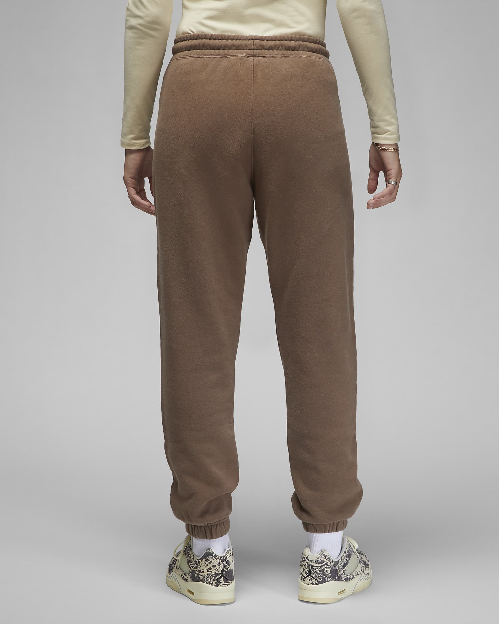 Air Jordan Wordmark Women's Fleece Trousers. Nike IE