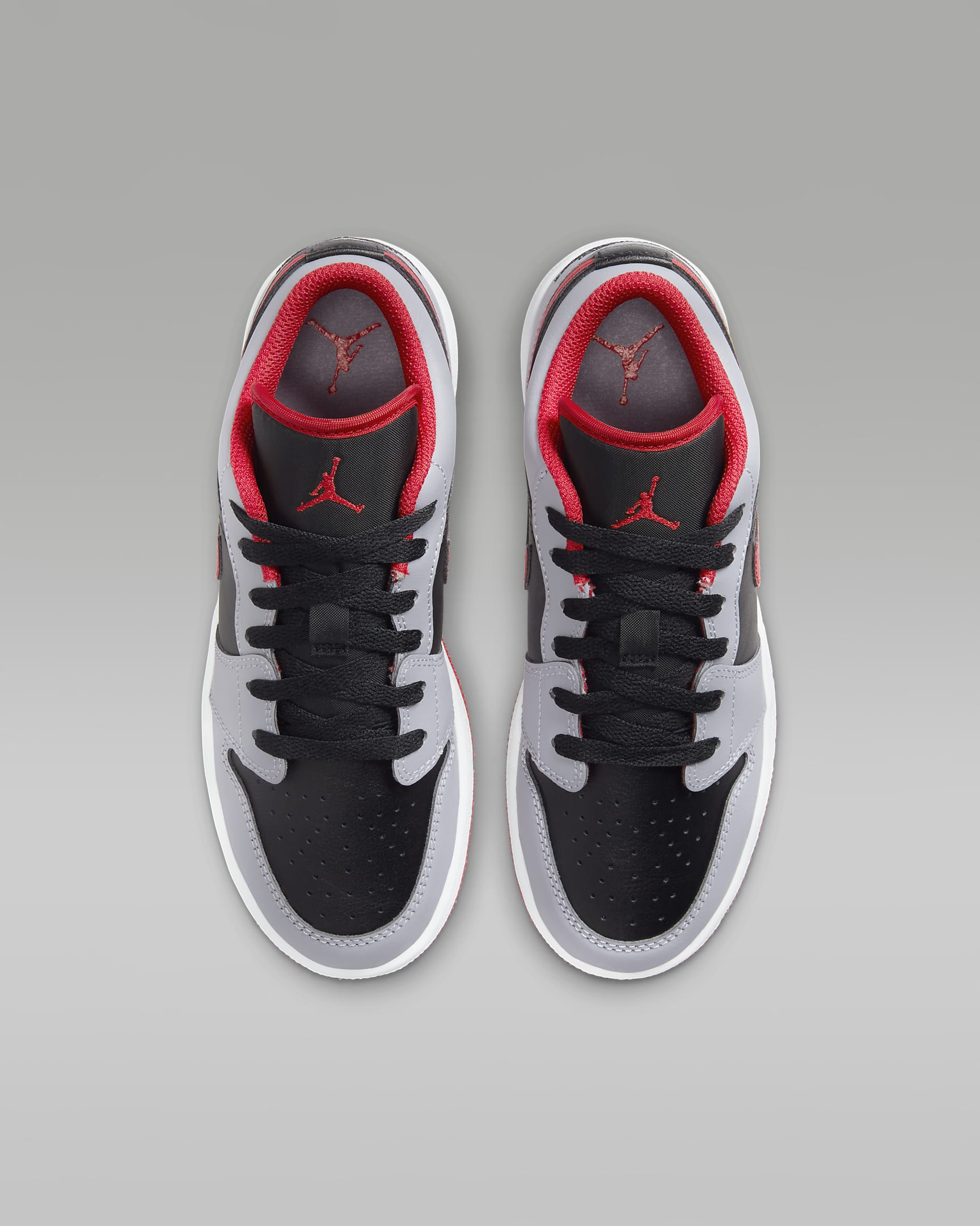 Air Jordan 1 Low Older Kids' Shoes. Nike AT