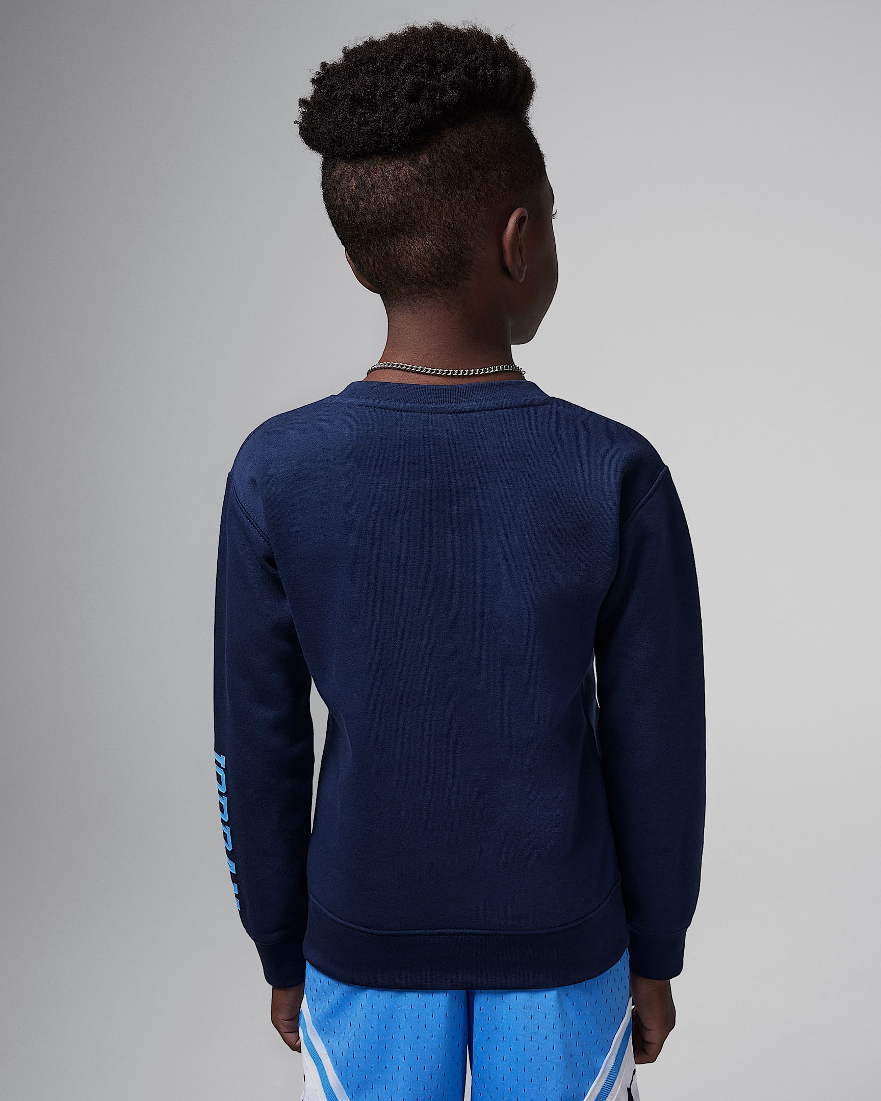 Playera de cuello redondo para niños talla pequeña Jordan "See Me Shine". Nike MX