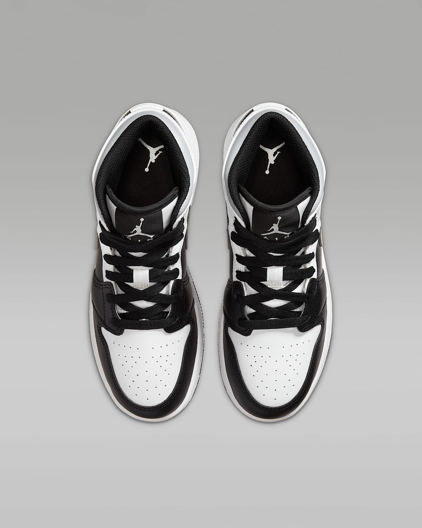 Jordan 1 Mid Older Kids' Shoes. Nike HU