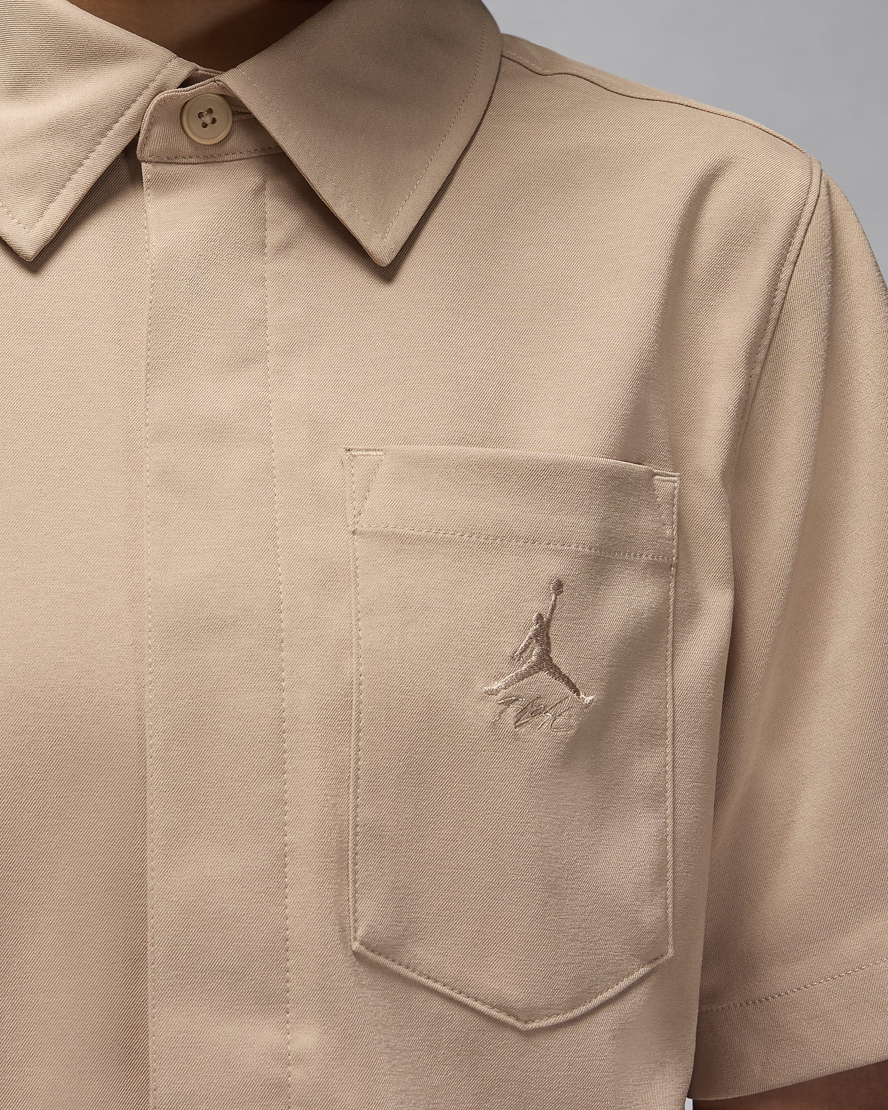 Jordan Women's Woven Crop Top. Nike SG