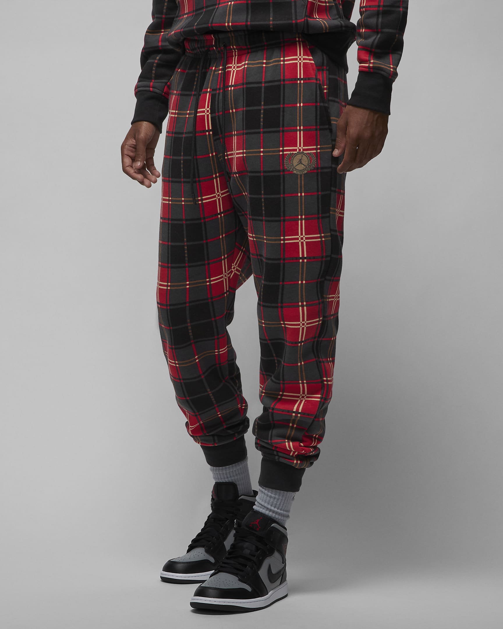Jordan Essential Festive Men's Fleece Trousers. Nike MY