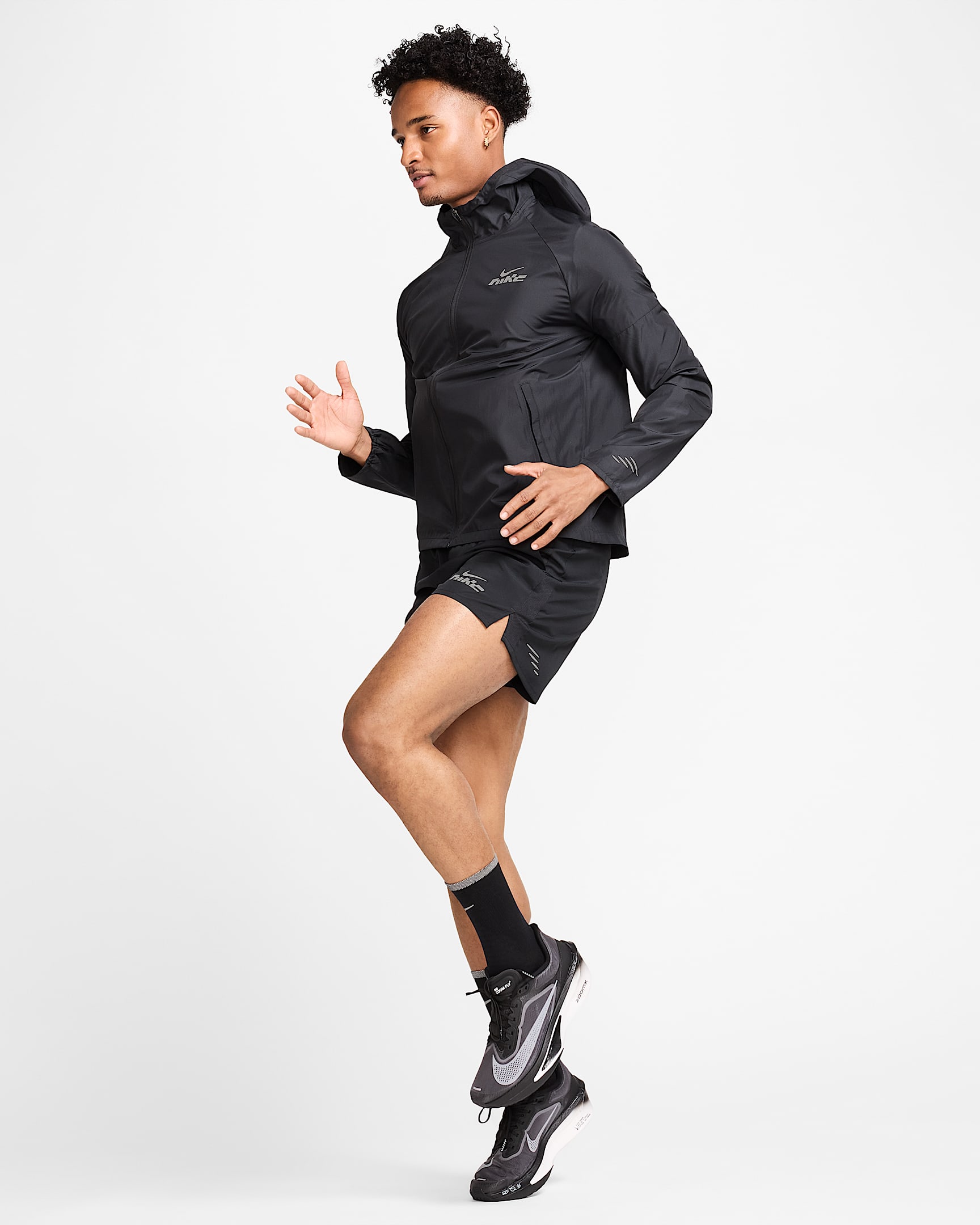 Nike Miler Flash wasserabweisende Laufjacke (Herren). Nike DE