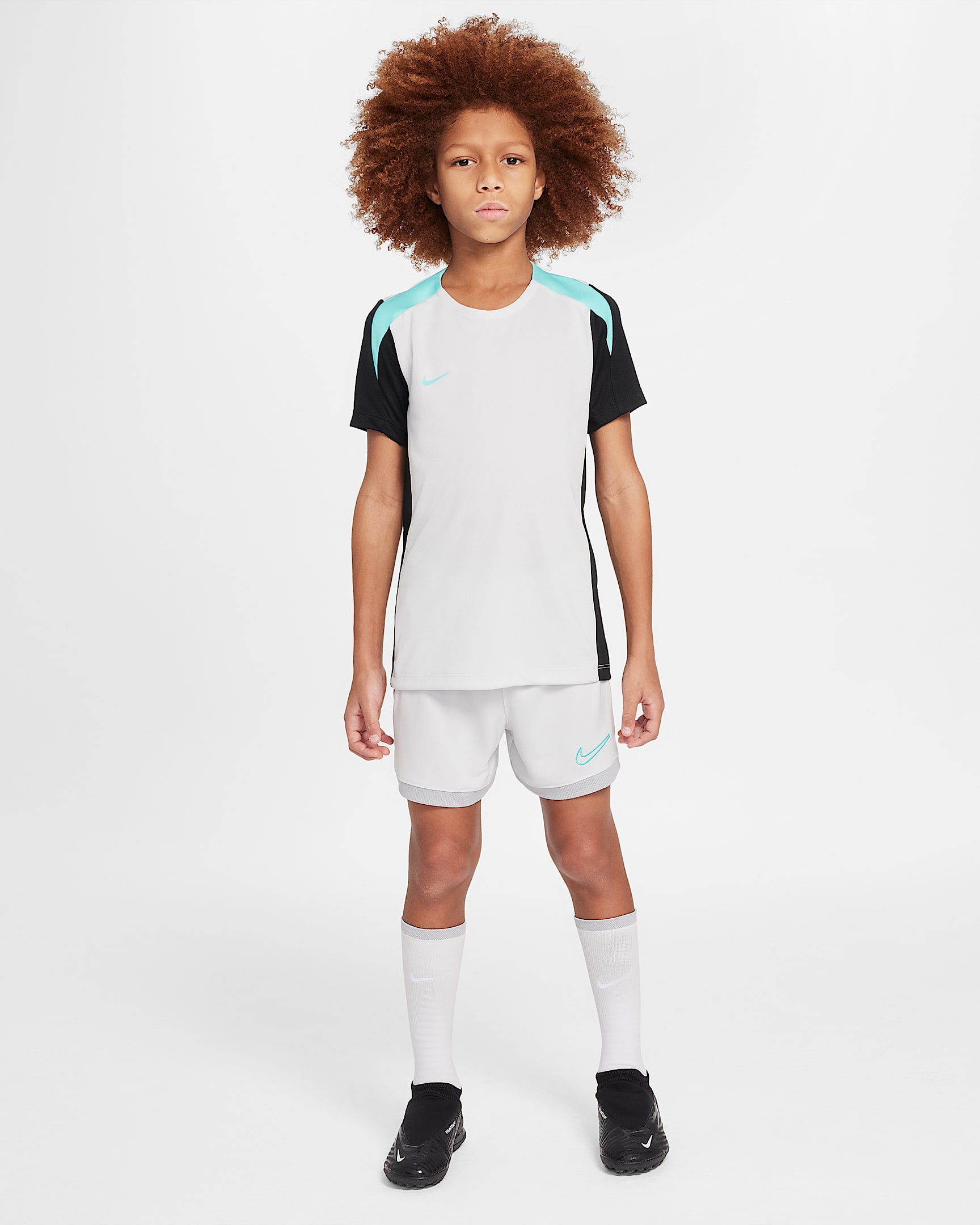 Nike Dri-FIT Strike Older Kids' Short-Sleeve Football Top. Nike IE