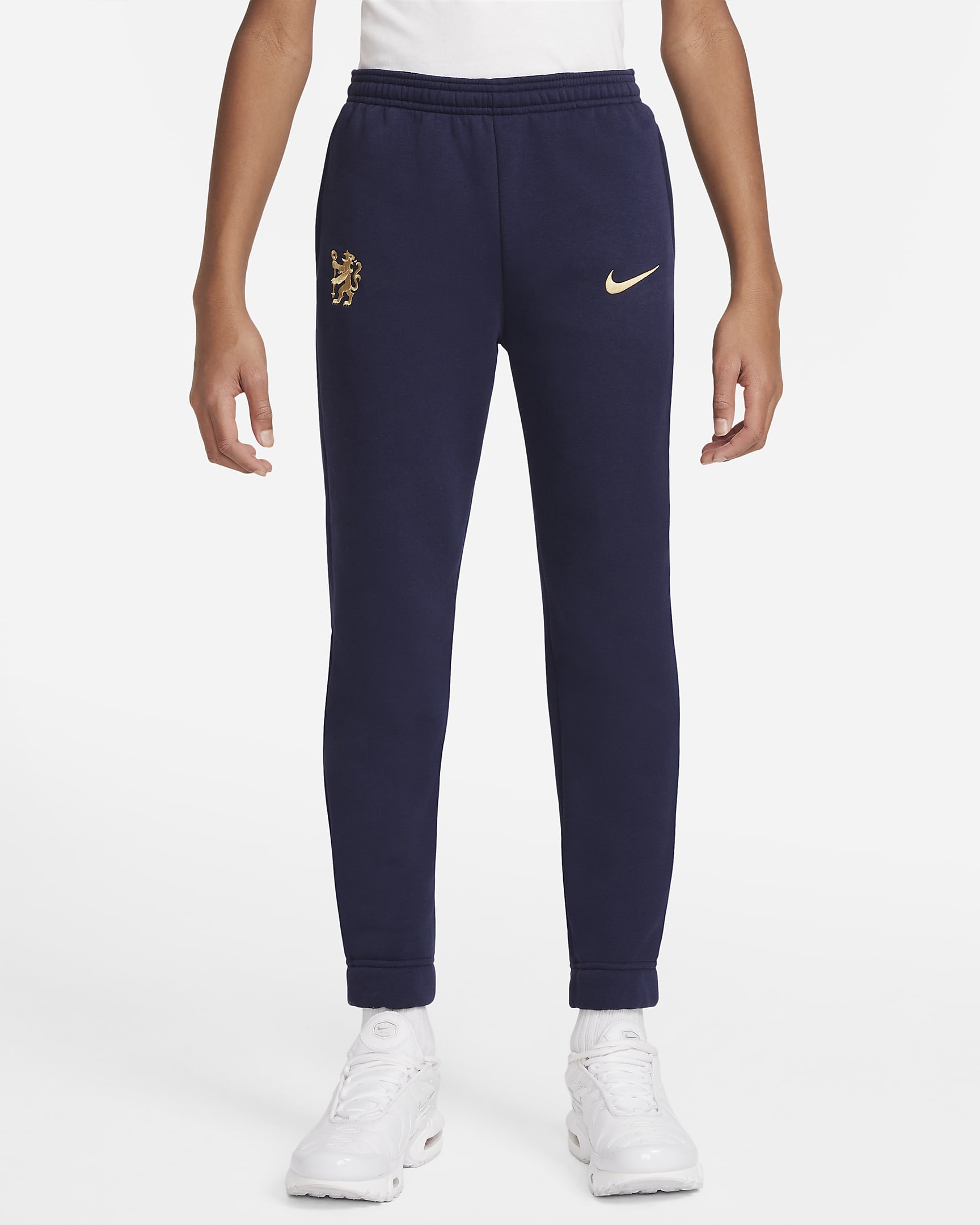 Chelsea F.C. Older Kids’ Fleece Football Pants. Nike NL