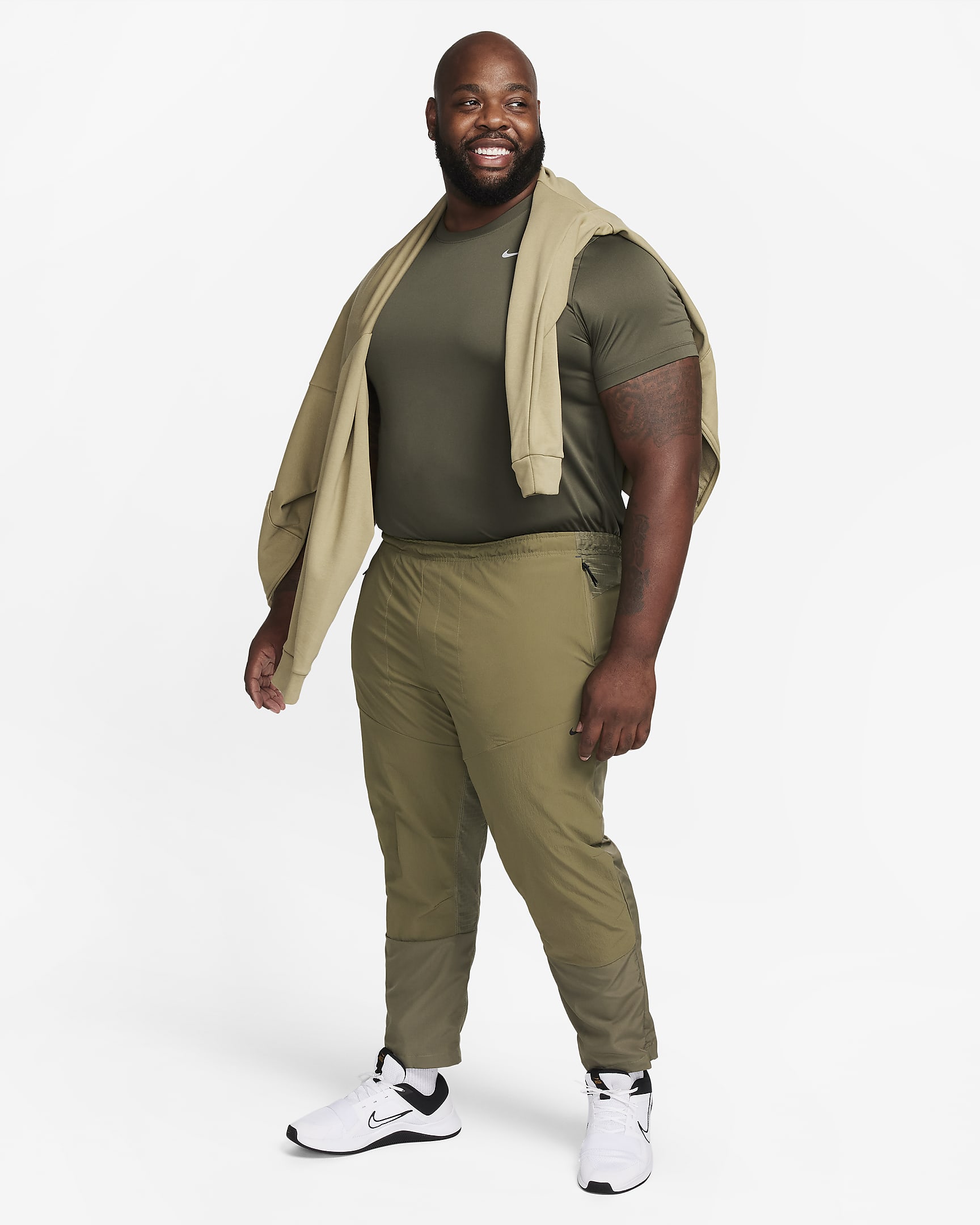 Nike APS Men's Dri-FIT ADV Woven Versatile Trousers. Nike IL