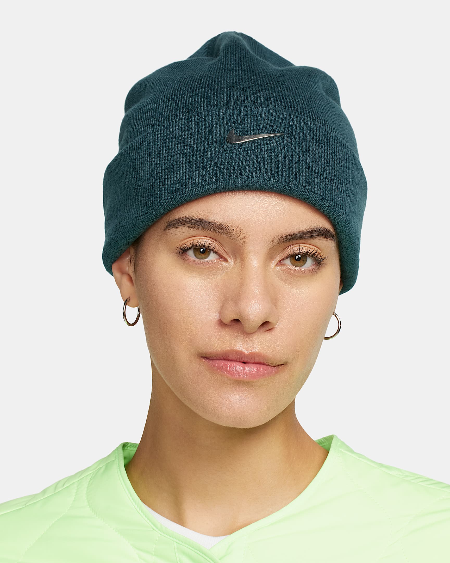 Nike Peak Standard Cuff Metal Swoosh Beanie. Nike BE