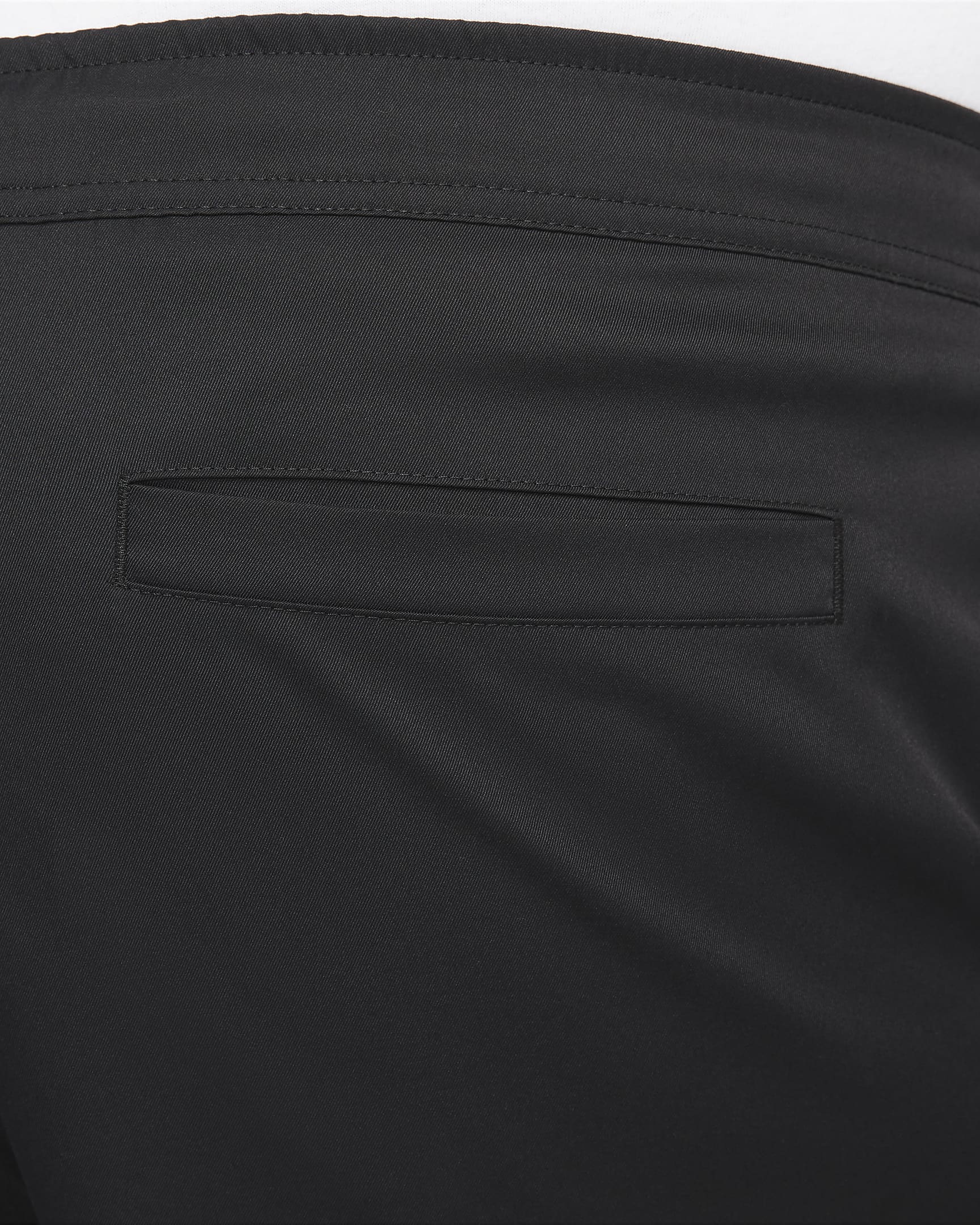 Pantalon tissé fuselé Nike Club pour homme. Nike LU