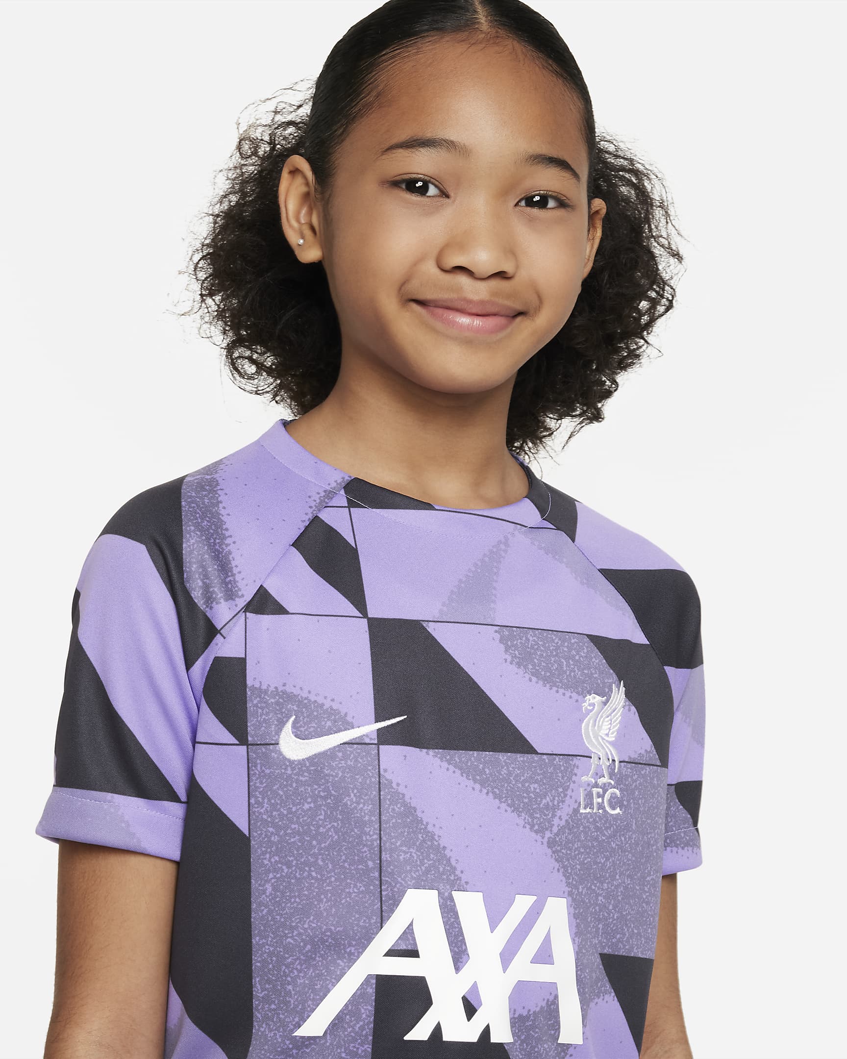 Liverpool F.C. Academy Pro Third Older Kids' Nike Dri-FIT Football Pre-Match Top. Nike IE