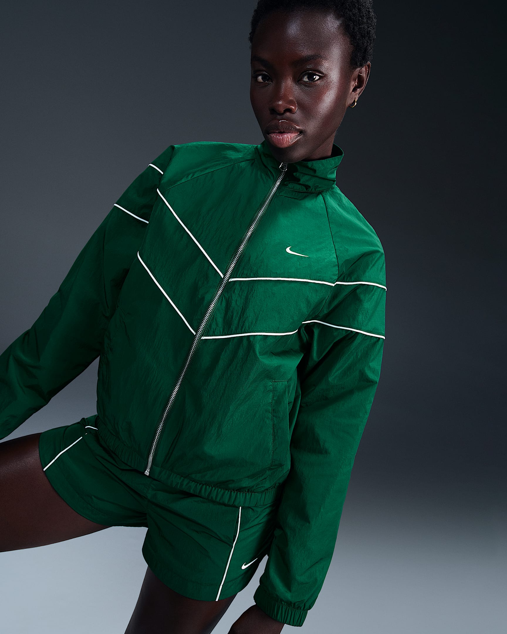 Nike Windrunner Women's Loose UV Woven Full-Zip Jacket. Nike CA