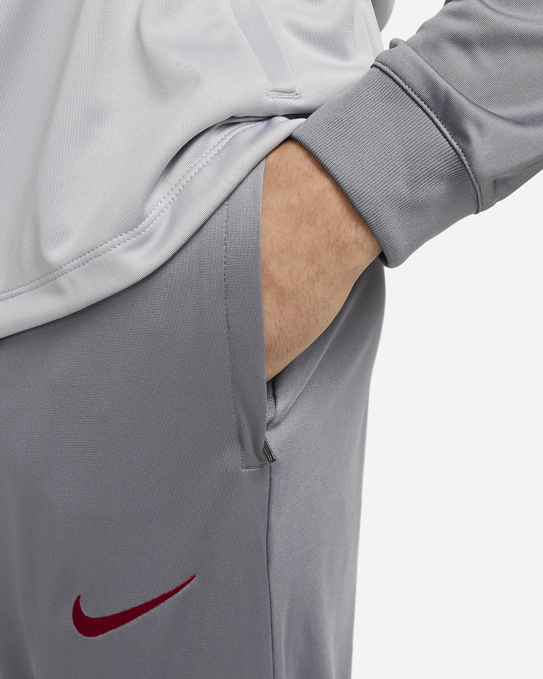 Liverpool F.C. Strike Men's Nike Dri-FIT Hooded Tracksuit. Nike UK