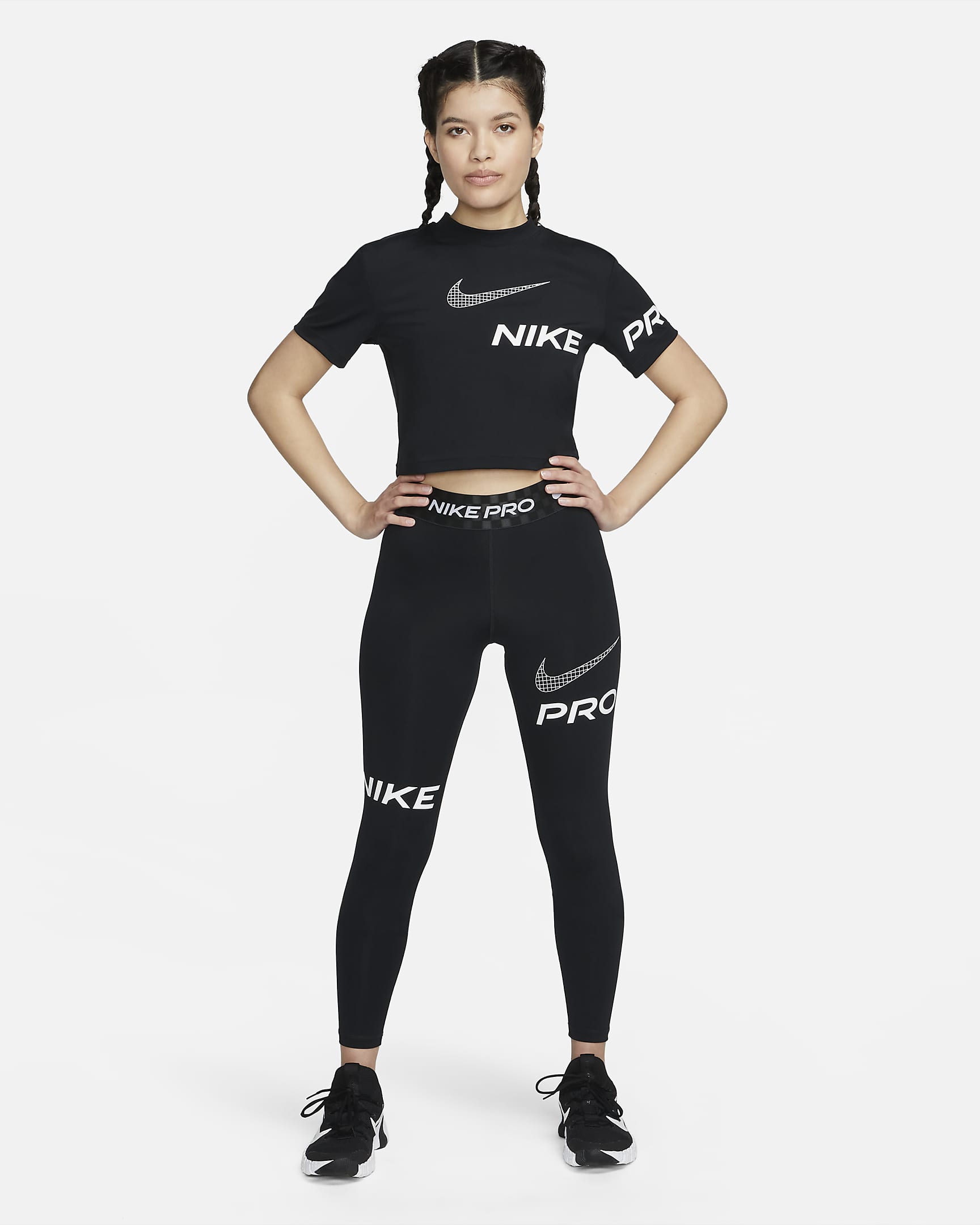 เลกกิ้งเทรนนิ่งขายาวเอวปานกลางผู้หญิงมีกราฟิกเต็มความยาว Nike Pro Dri Fit Nike Th