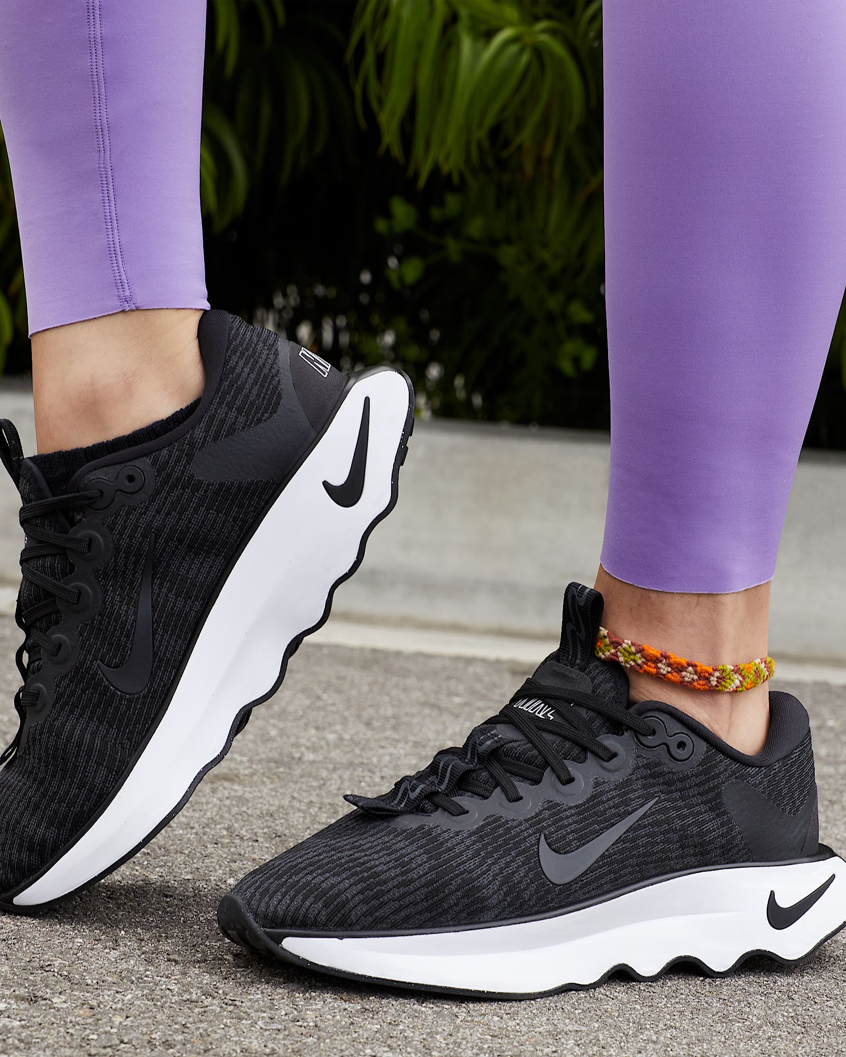 Nike Motiva 女款健走鞋。Nike TW