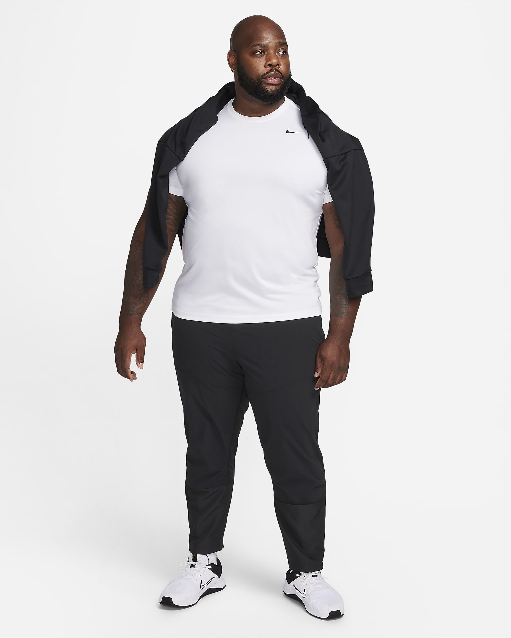 Nike APS Men's Dri-FIT ADV Woven Versatile Trousers. Nike SI