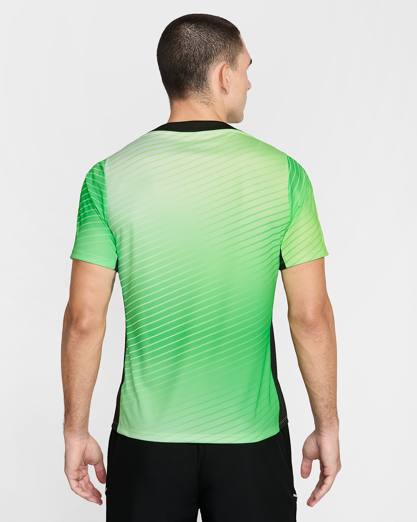Maglia da calcio pre-partita a manica corta Nike Dri-FIT Australia Academy Pro – Uomo. Nike IT