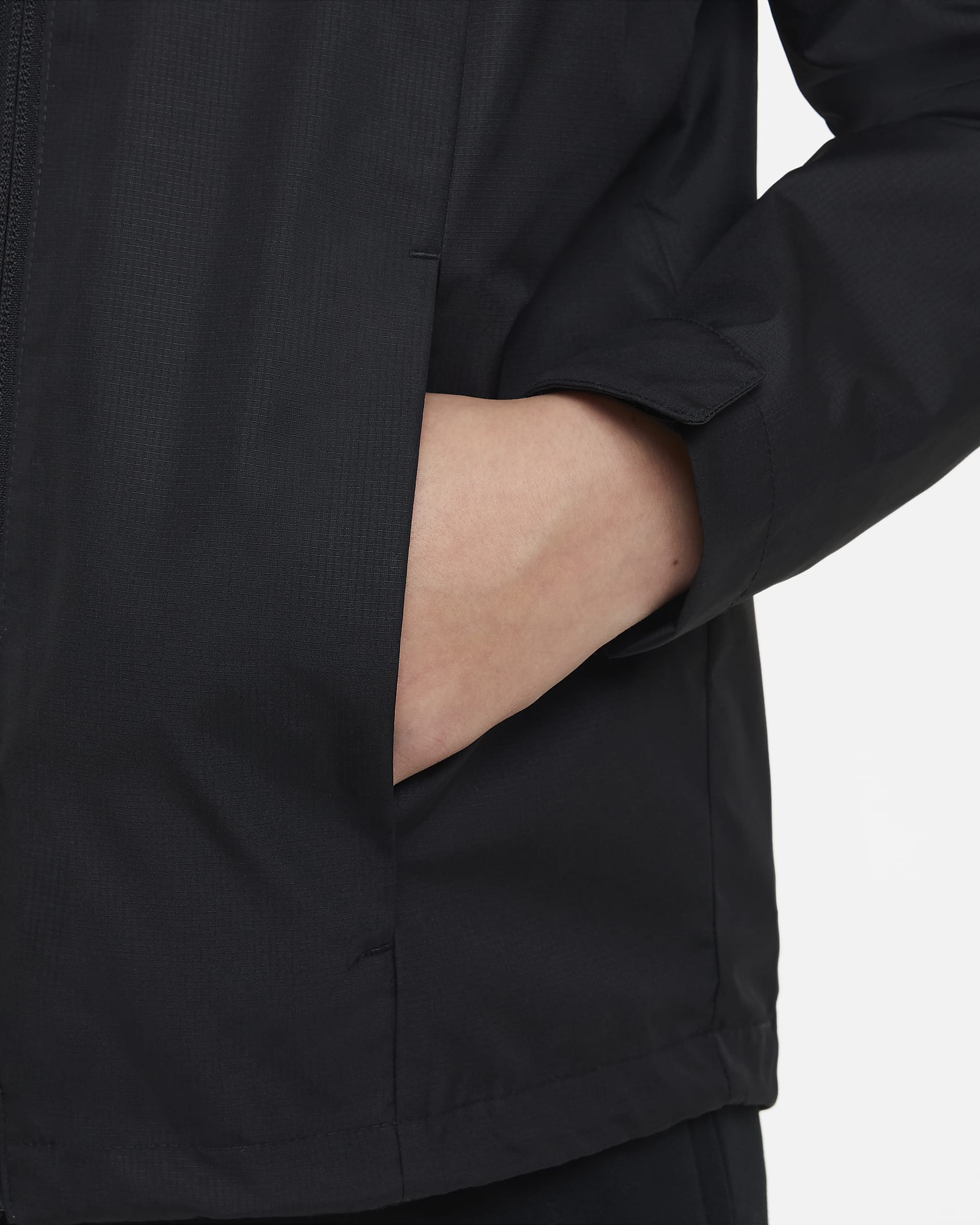 Nike Storm-FIT Academy23 Older Kids' Football Rain Jacket. Nike AT