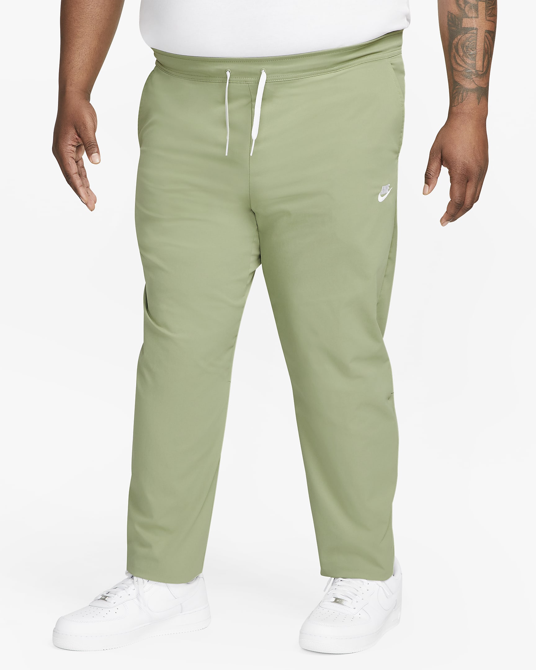 Pantalon tissé fuselé Nike Club pour homme. Nike BE