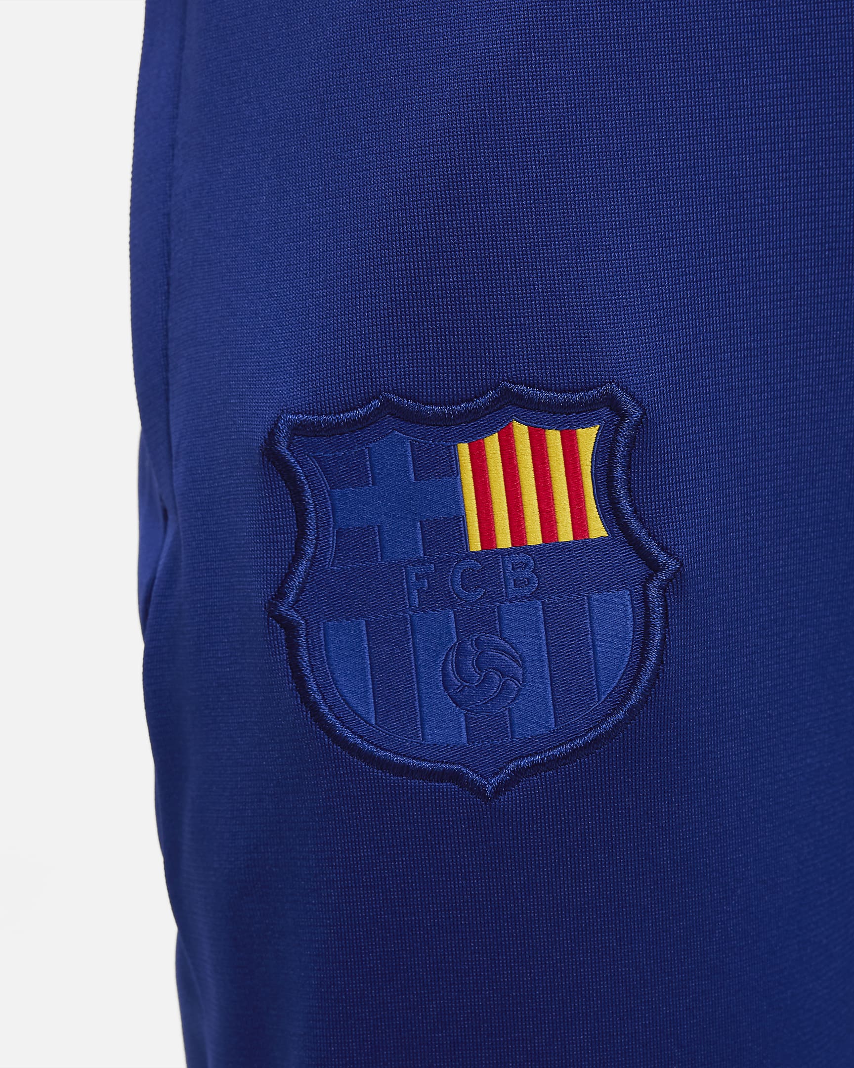 F.C. Barcelona Strike Older Kids' Nike Dri-FIT Football Tracksuit. Nike IL