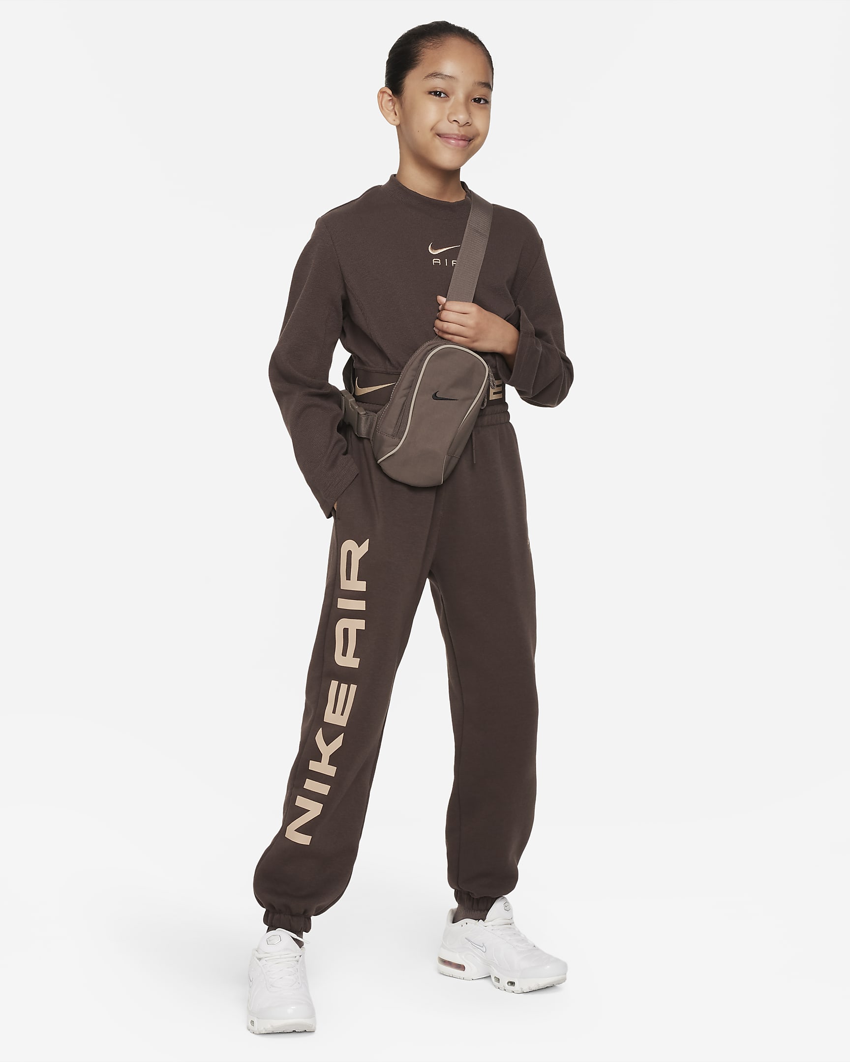 Nike Air Club Fleece Older Kids' (Girls') Trousers. Nike AT