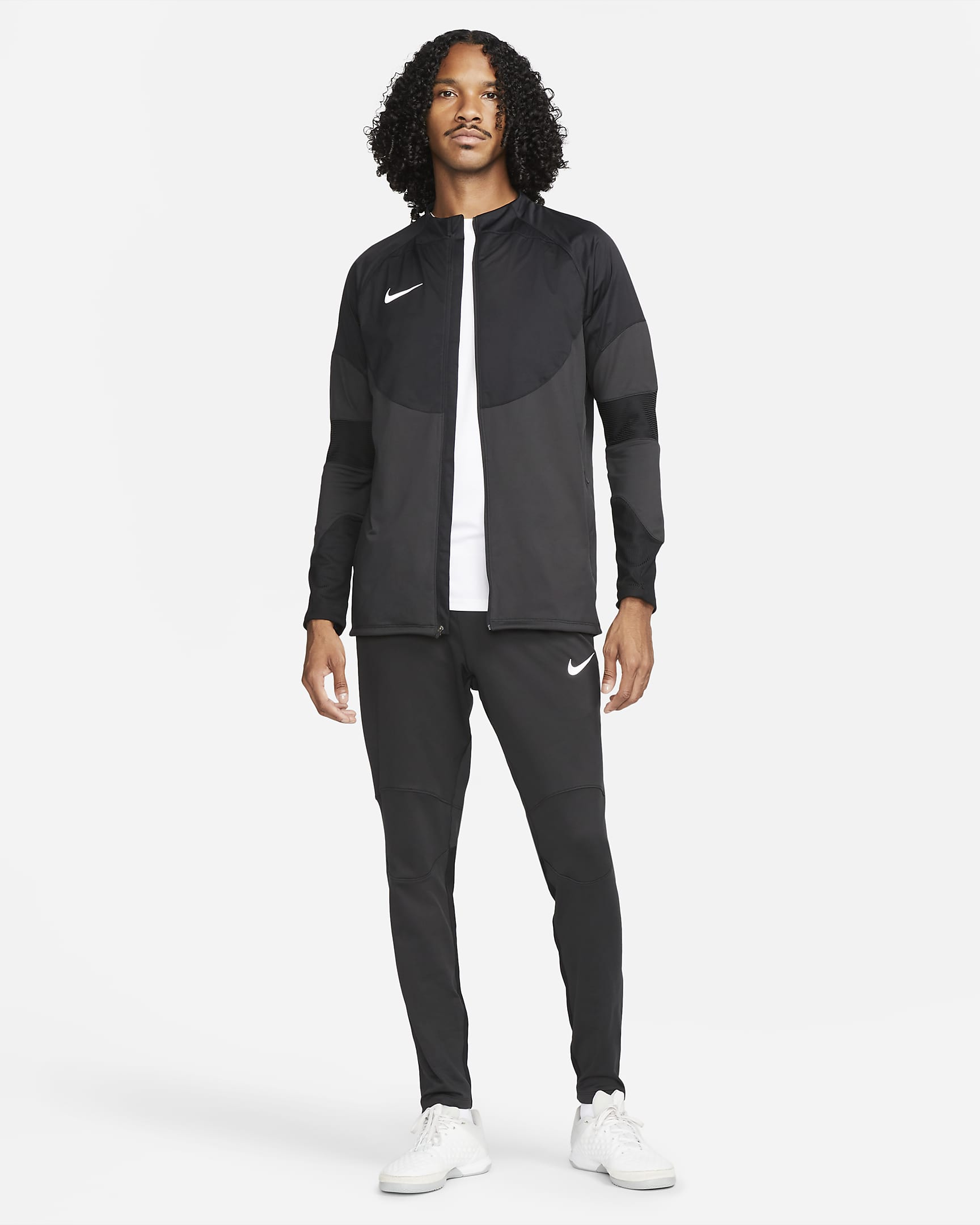 Nike Therma-FIT Strike Winter Warrior Men's Football Pants. Nike BE