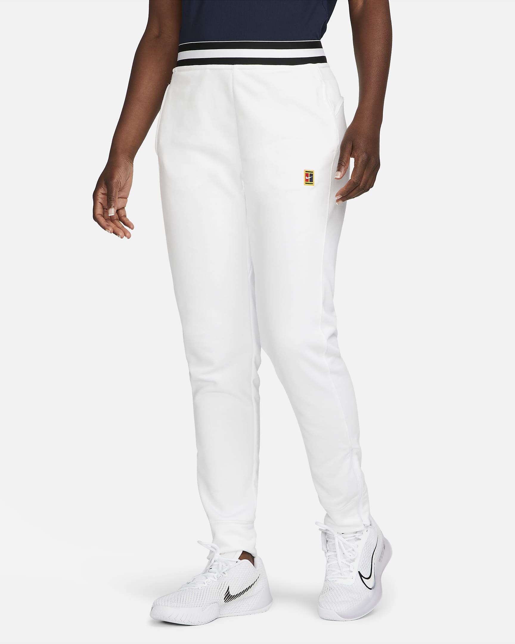 NikeCourt Dri-FIT Heritage Women's French Terry Tennis Trousers. Nike IL