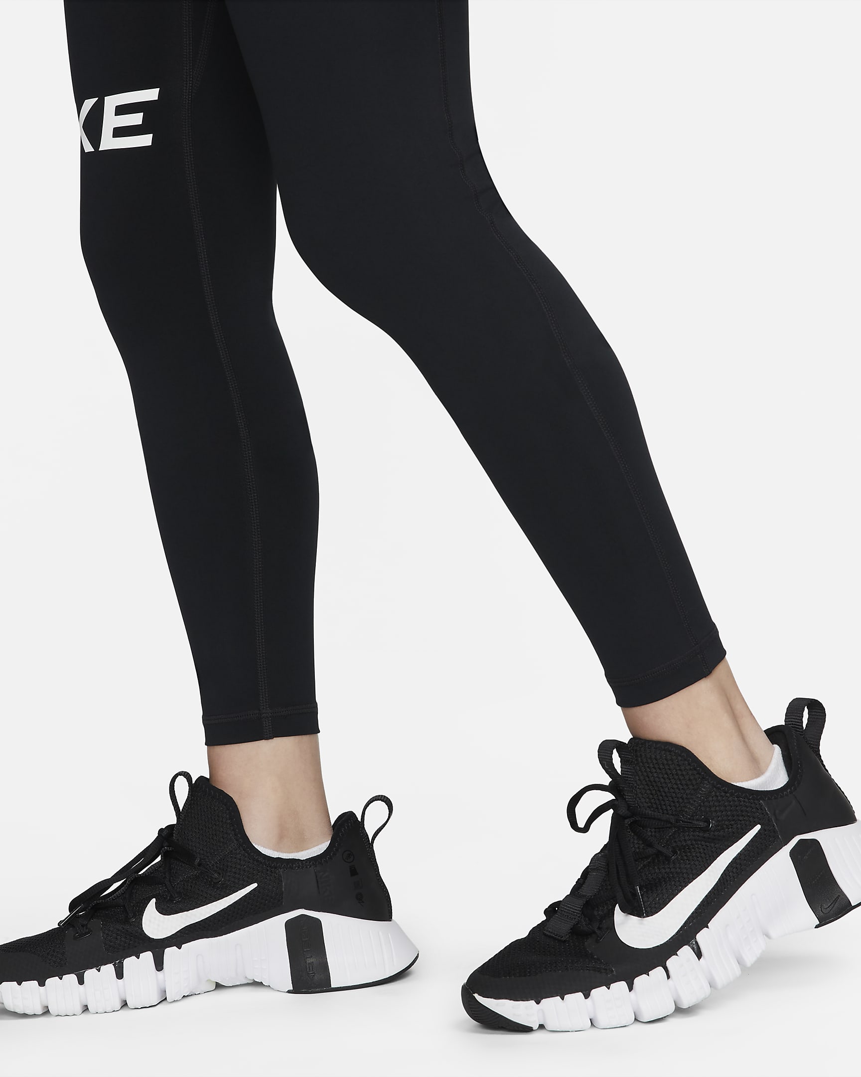 เลกกิ้งเทรนนิ่งขายาวเอวปานกลางผู้หญิงมีกราฟิกเต็มความยาว Nike Pro Dri