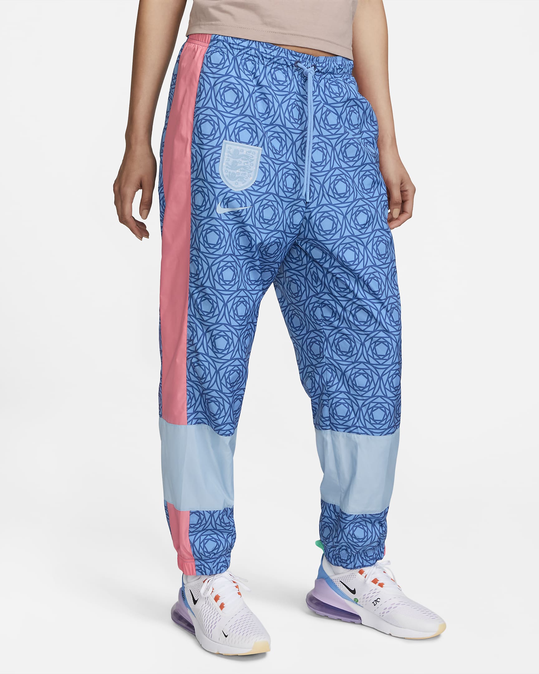 Calças desportivas de cintura normal Nike Repel Essential Inglaterra ...