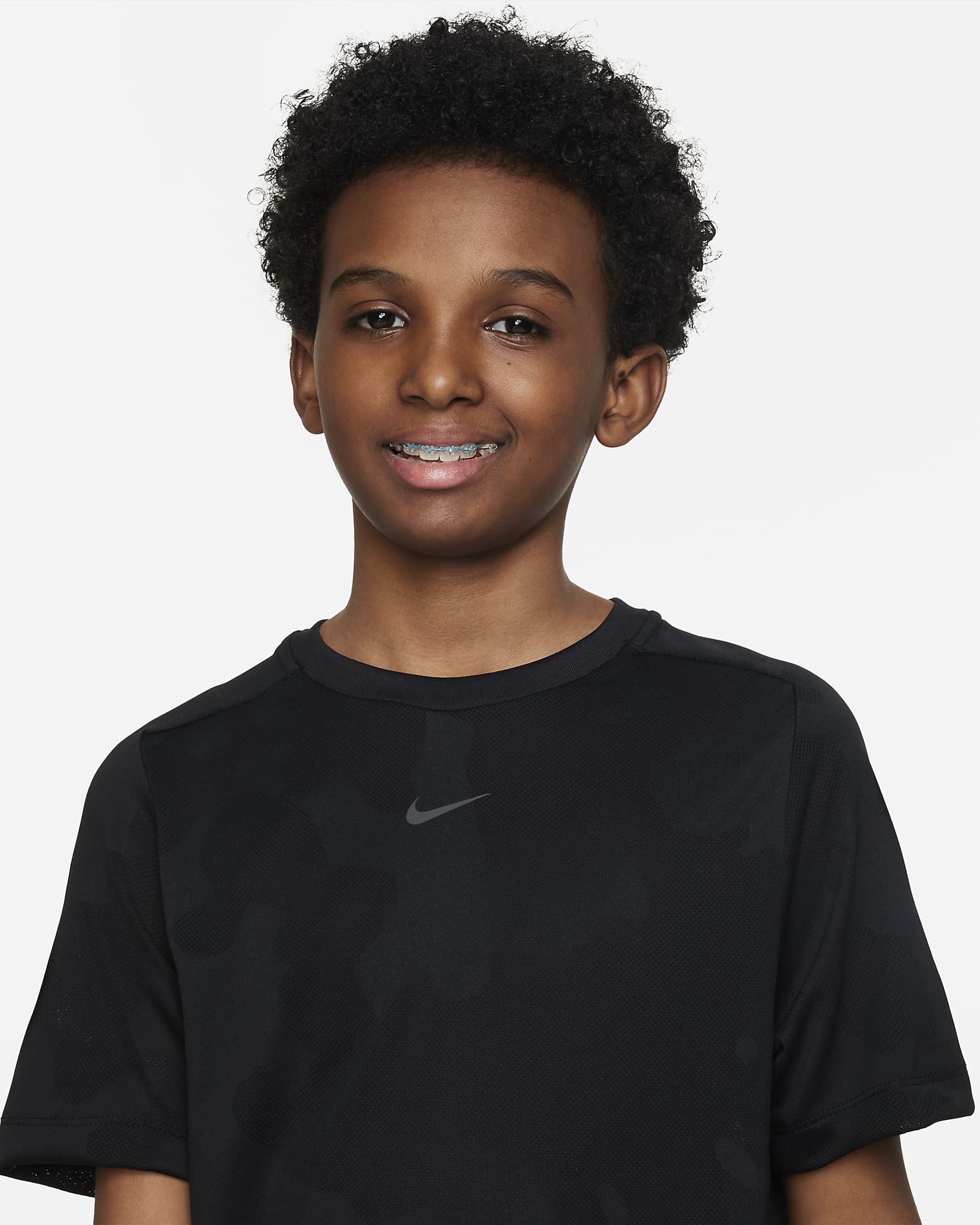 Nike Dri-FIT Multi+ Older Kids' (Boys) Training Top. Nike IE