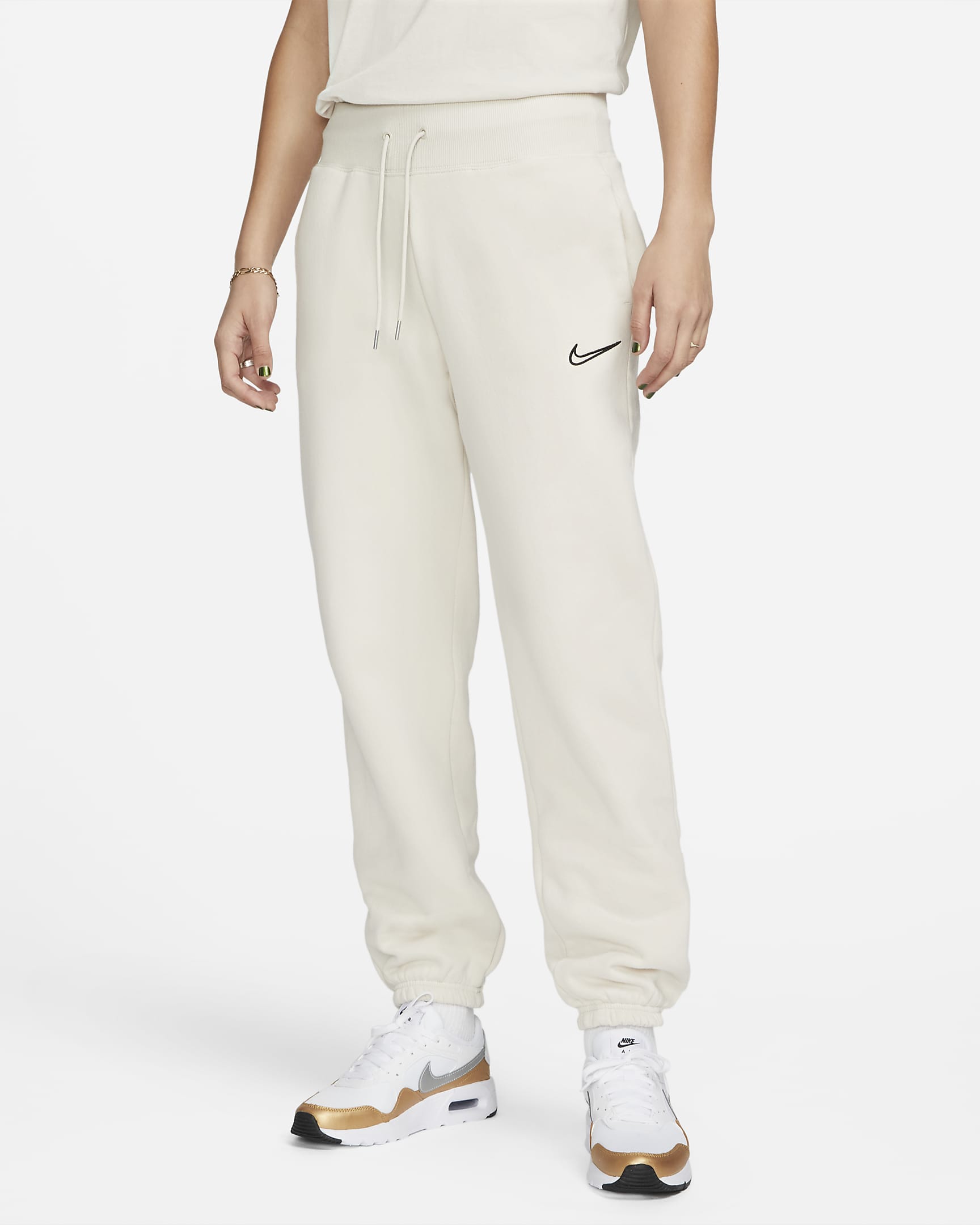 Nike Sportswear Phoenix Fleece Women's High-Waisted Tracksuit Bottoms. Nike UK