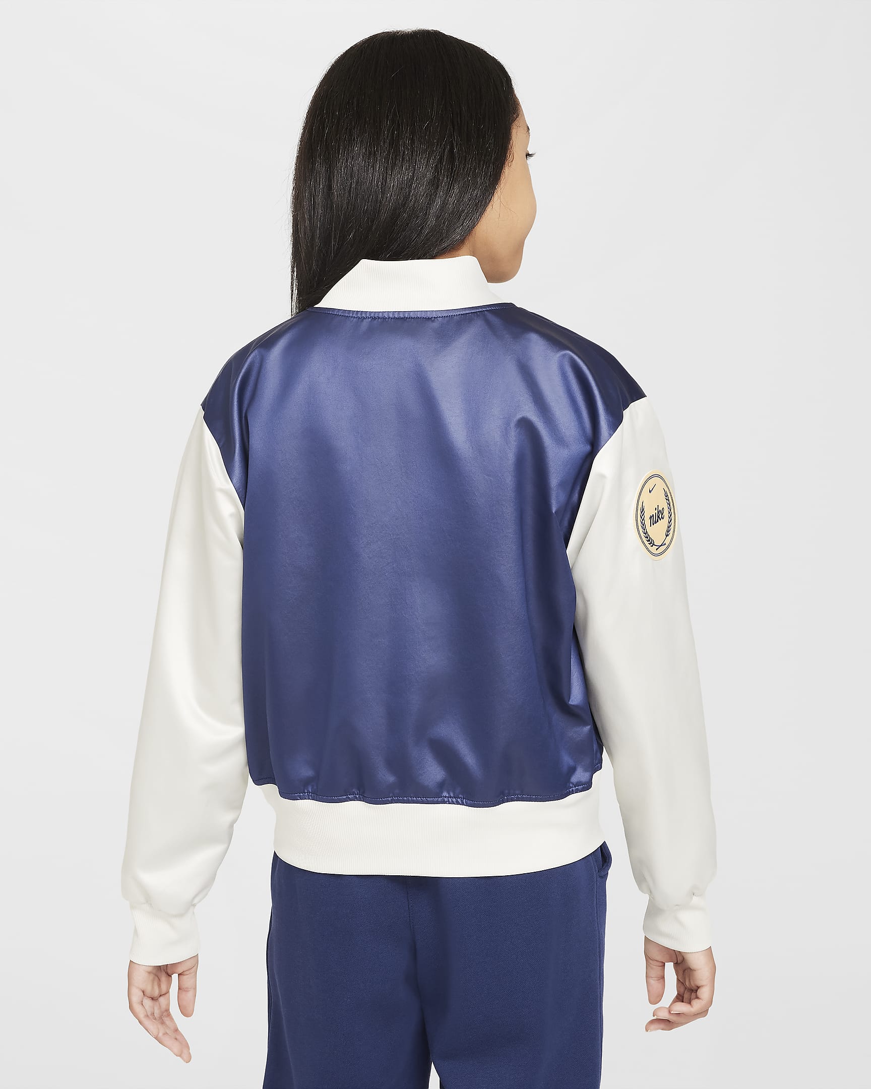 Nike Sportswear Girls' Varsity Jacket. Nike IE