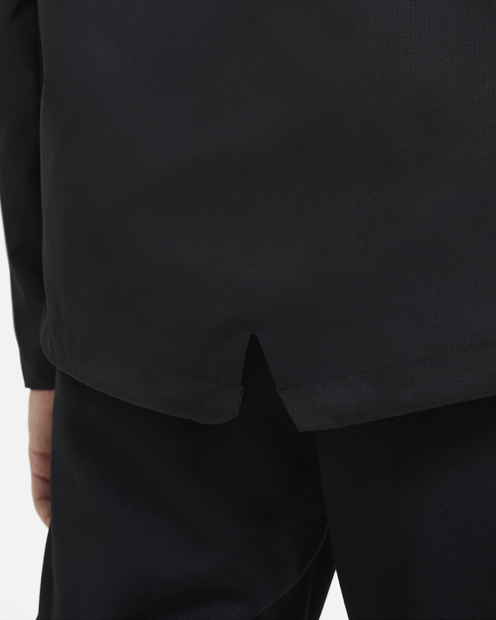 Nike Storm-FIT Academy23 Older Kids' Football Rain Jacket. Nike LU