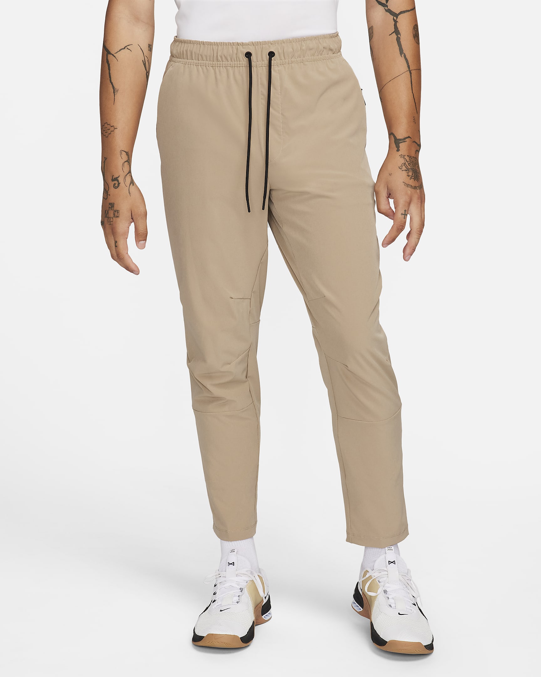 Nike Unlimited Men's Dri-FIT Tapered Leg Versatile Pants. Nike.com