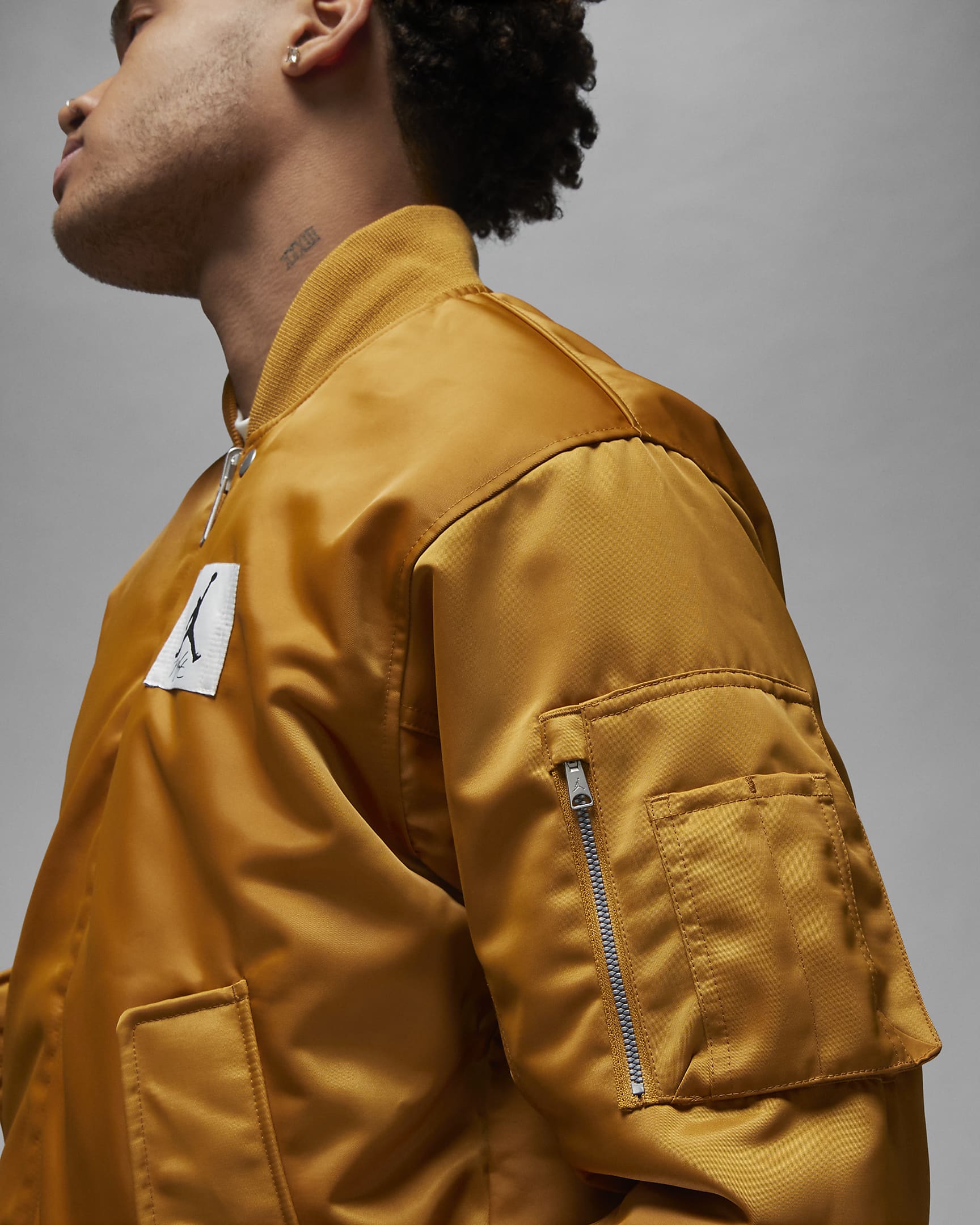 Jordan Essentials Men's Statement Varsity Jacket. Nike LU