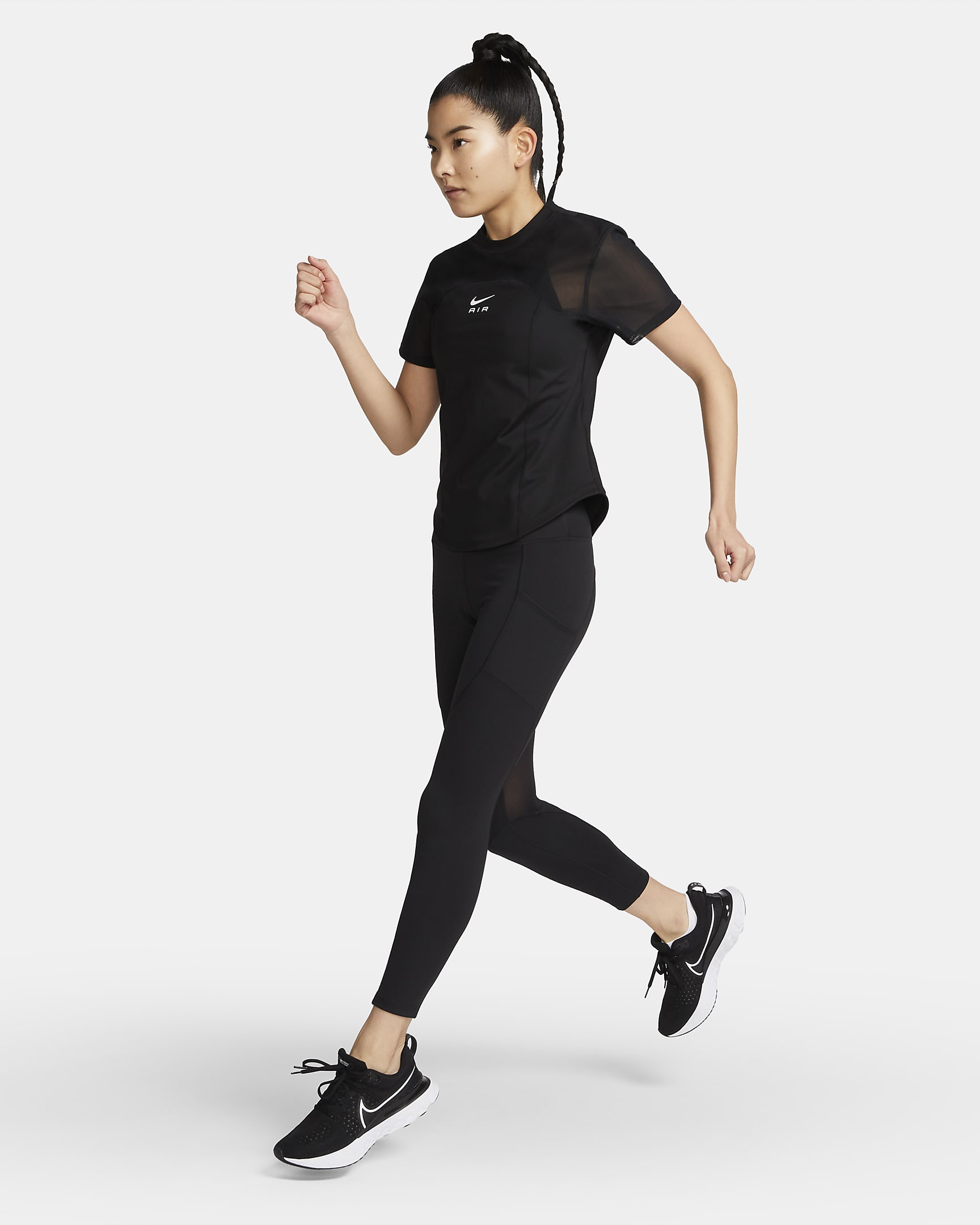 เลกกิ้งวิ่งเอวปานกลาง 7/8 ส่วนผู้หญิงพร้อมกระเป๋า Nike Air Nike TH