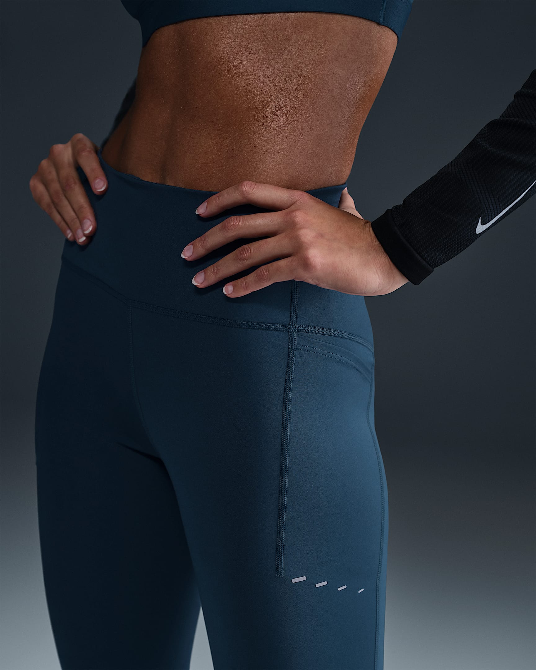 Nike Swift 7/8-løbeleggings med høj talje og lommer til kvinder. Nike DK