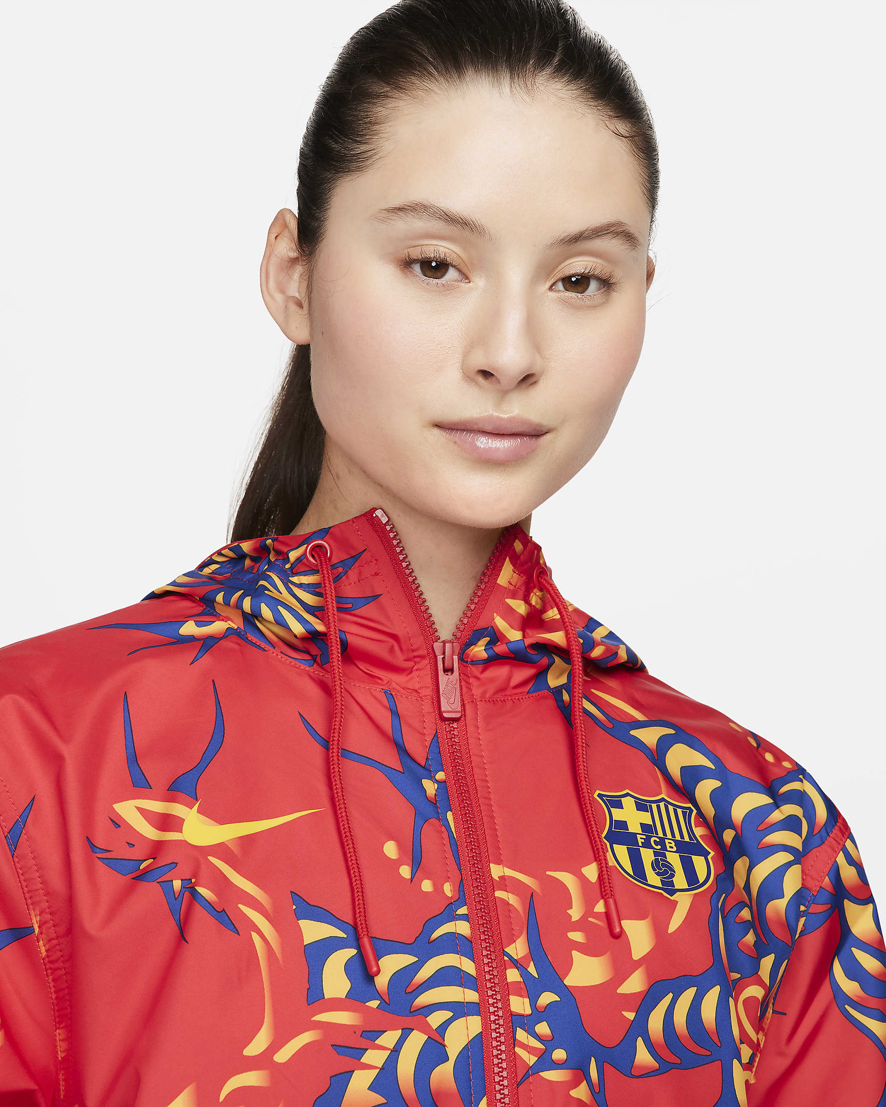 F.C. Barcelona Essential Women's Nike Football Repel Hooded Jacket. Nike DK